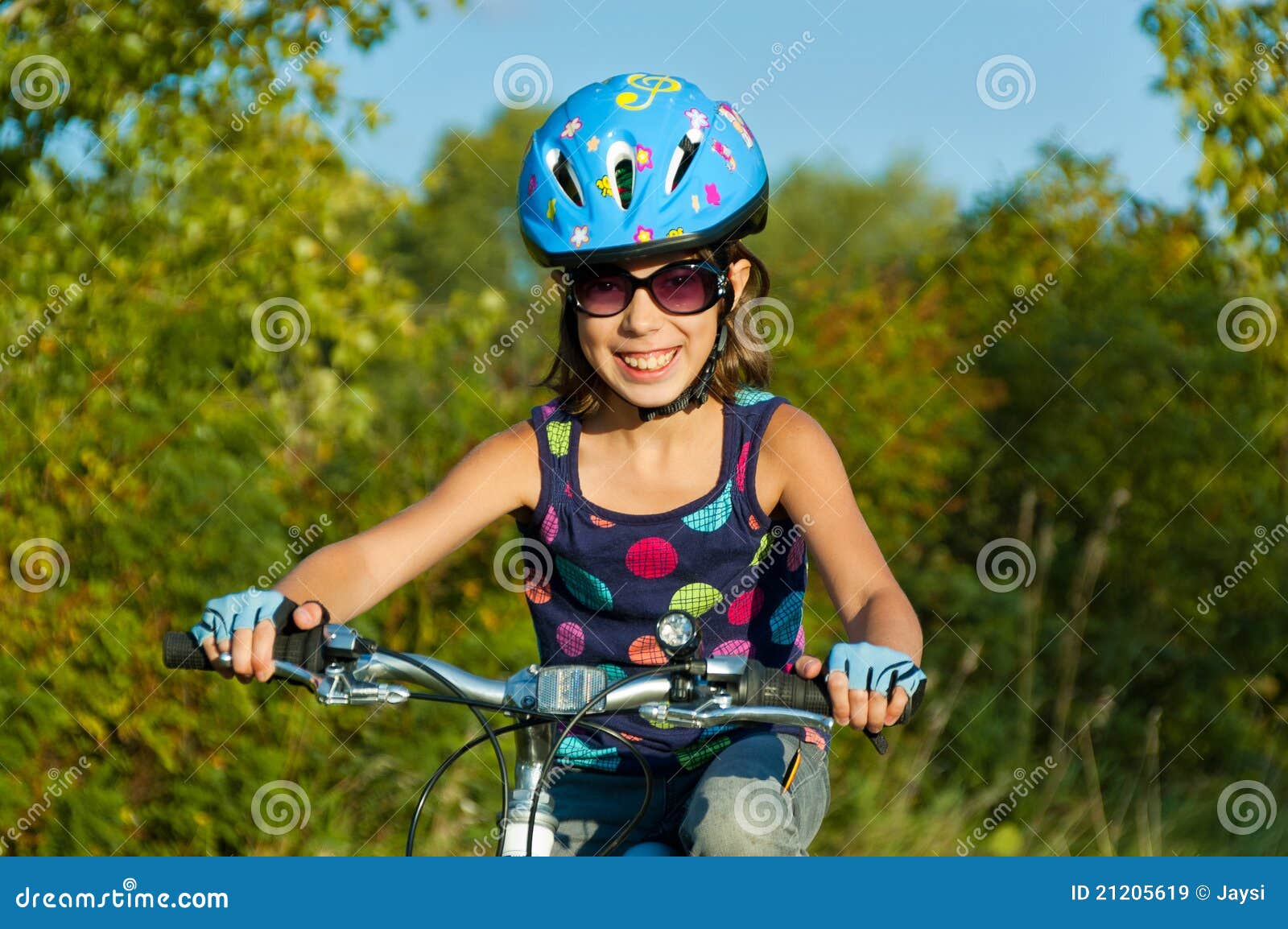 Smiling child on bicycle stock image. Image of portrait - 21205619