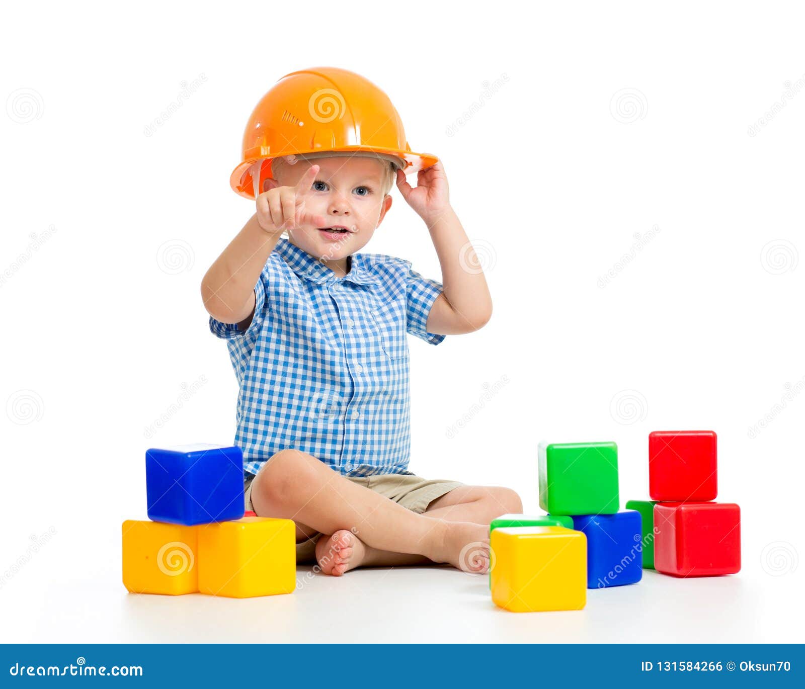 Smiling Child Boy with Hard Hat Playing Cubes, Isolated on White Stock ...