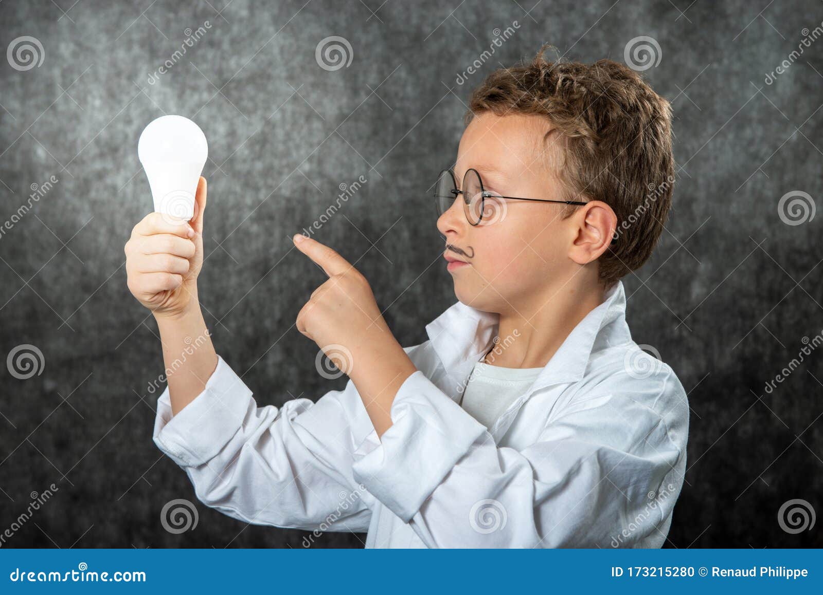 Smiling Child Boy with a Light Bulb Stock Photo - Image of portrait ...