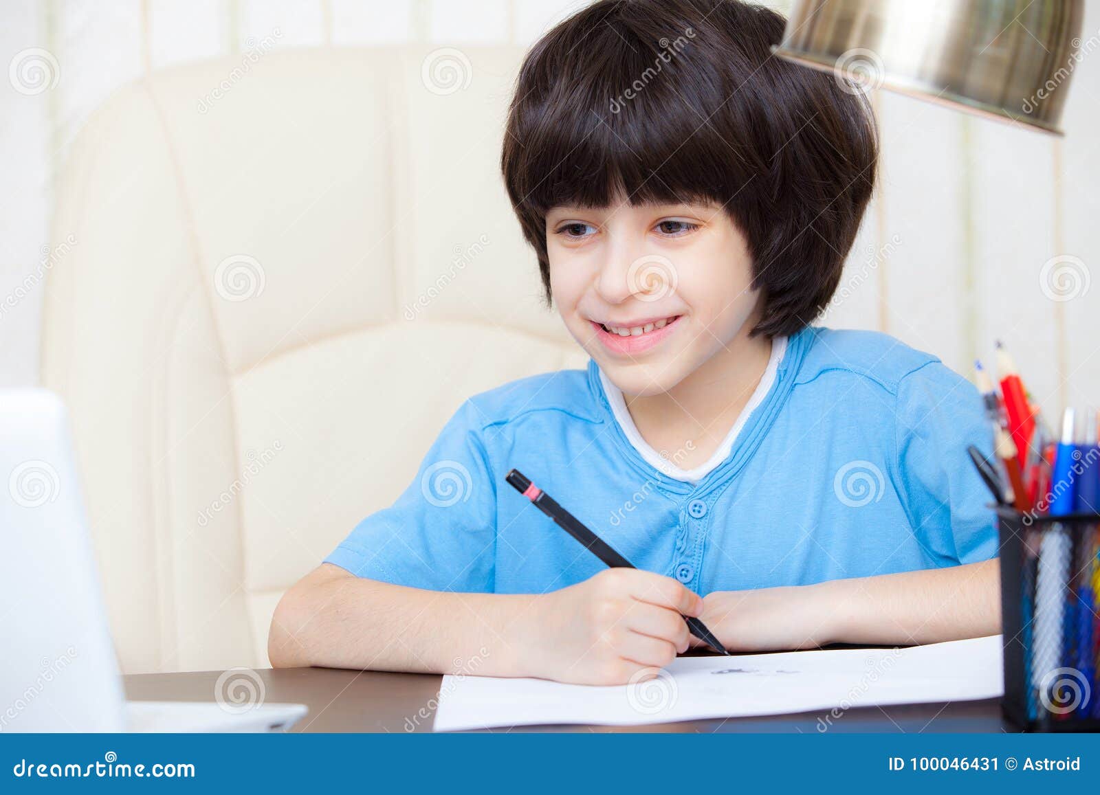 Smiling Child Doing Homework with Computer Stock Image - Image of ...