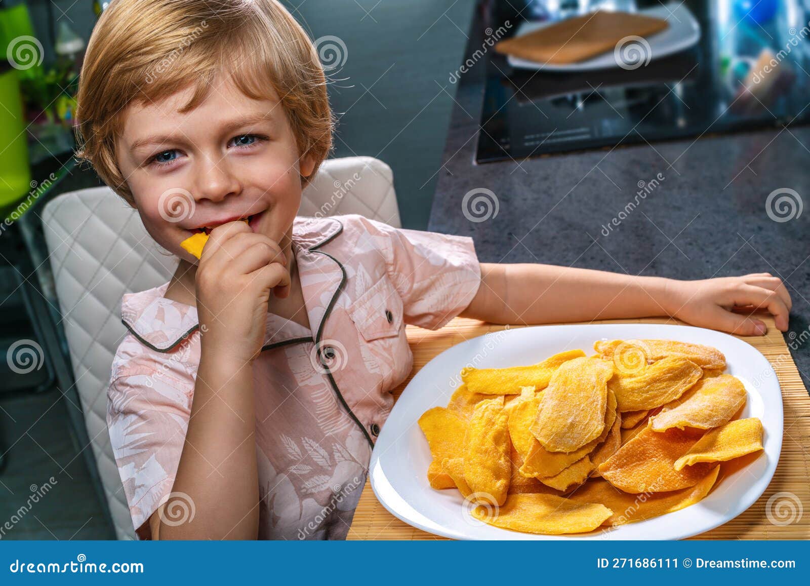 Smiling Child Eating Dried Mango Stock Image - Image of kitchen, happy ... Smiling Child Eating Dried Mango Stock Image - Image of kitchen, happy ...