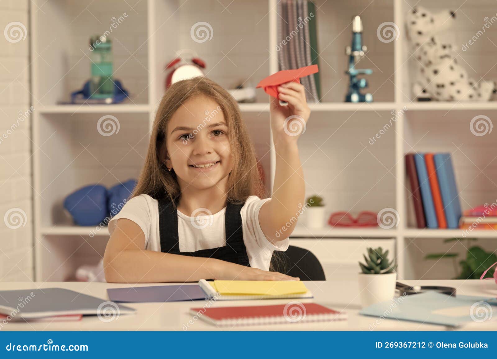 Smiling Child Play with Paper Plane in School Classroom Stock Photo ...