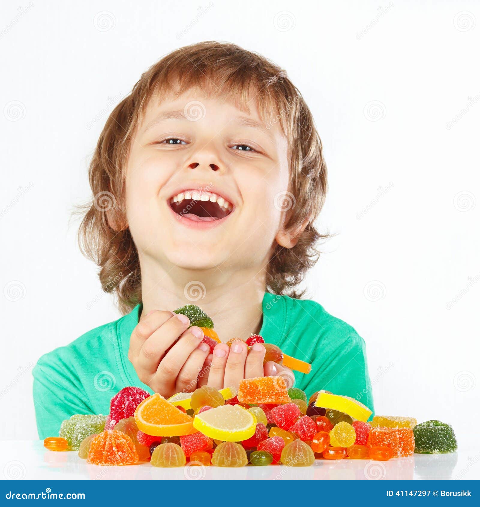 Smiling Child with Sweets and Candies on White Background Stock Image ...