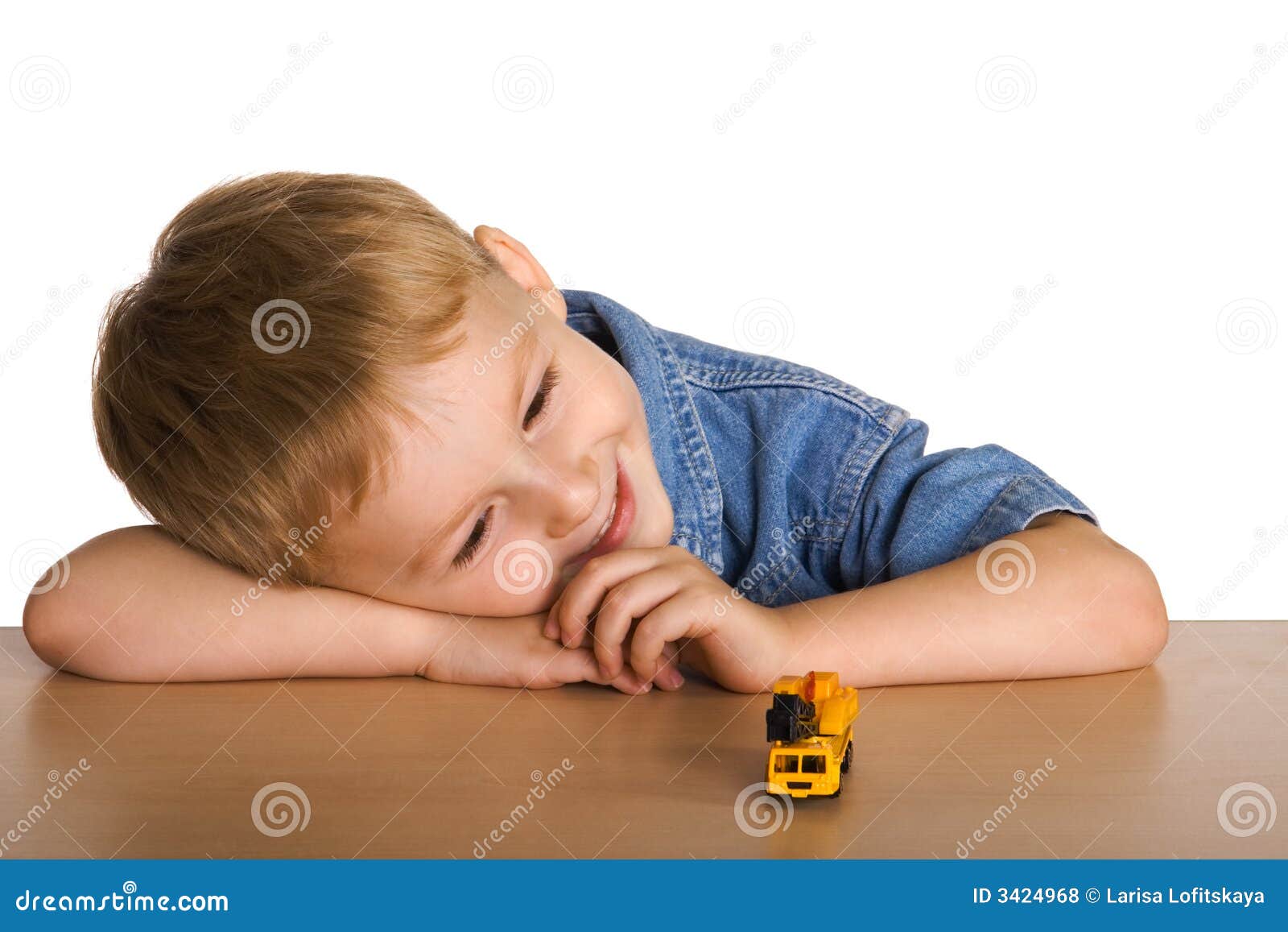 Smiling Child and Toy Machine Stock Photo - Image of table, isolated ...