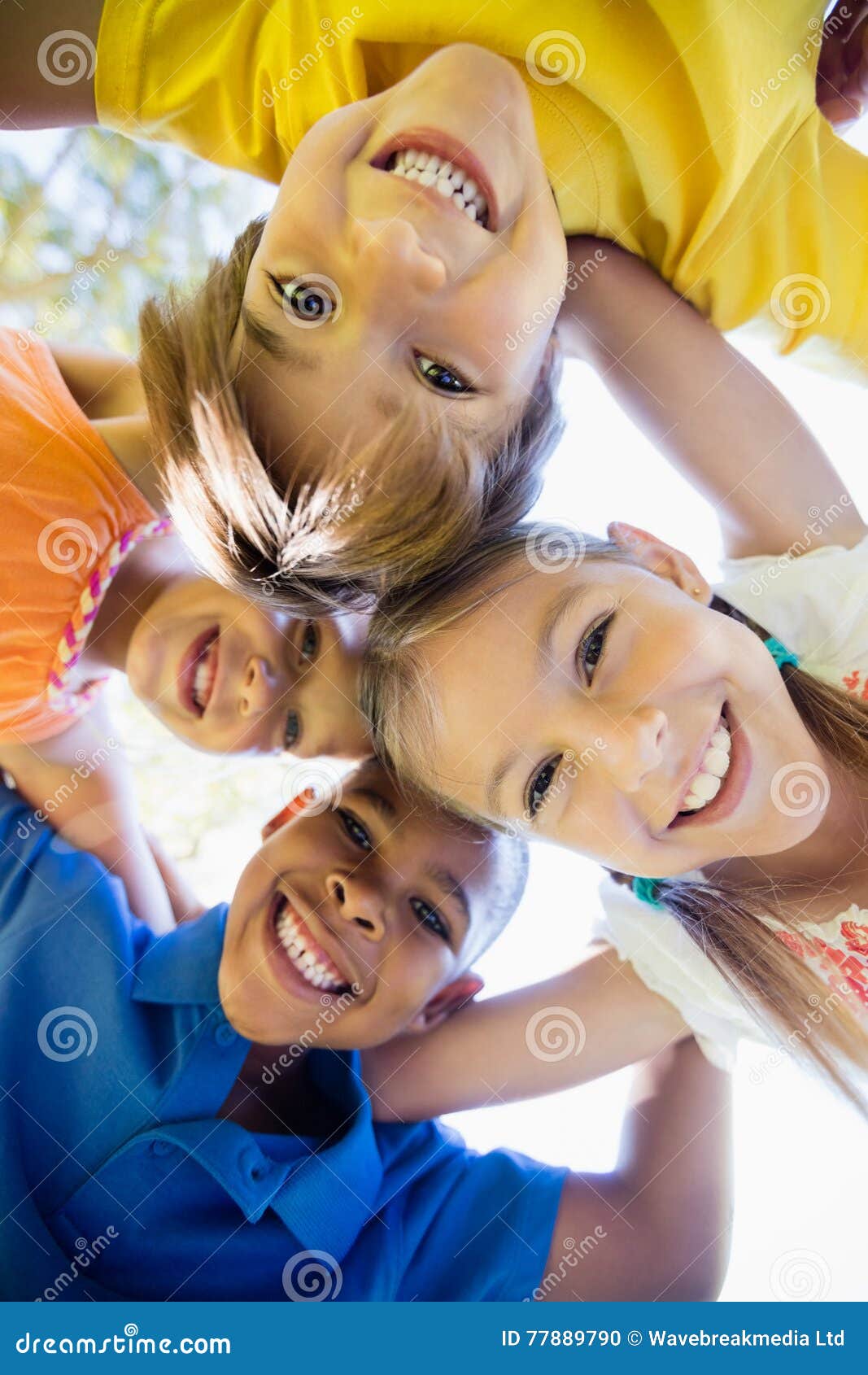 Smiling Children Forming a Huddle in Circle Stock Photo - Image of ...