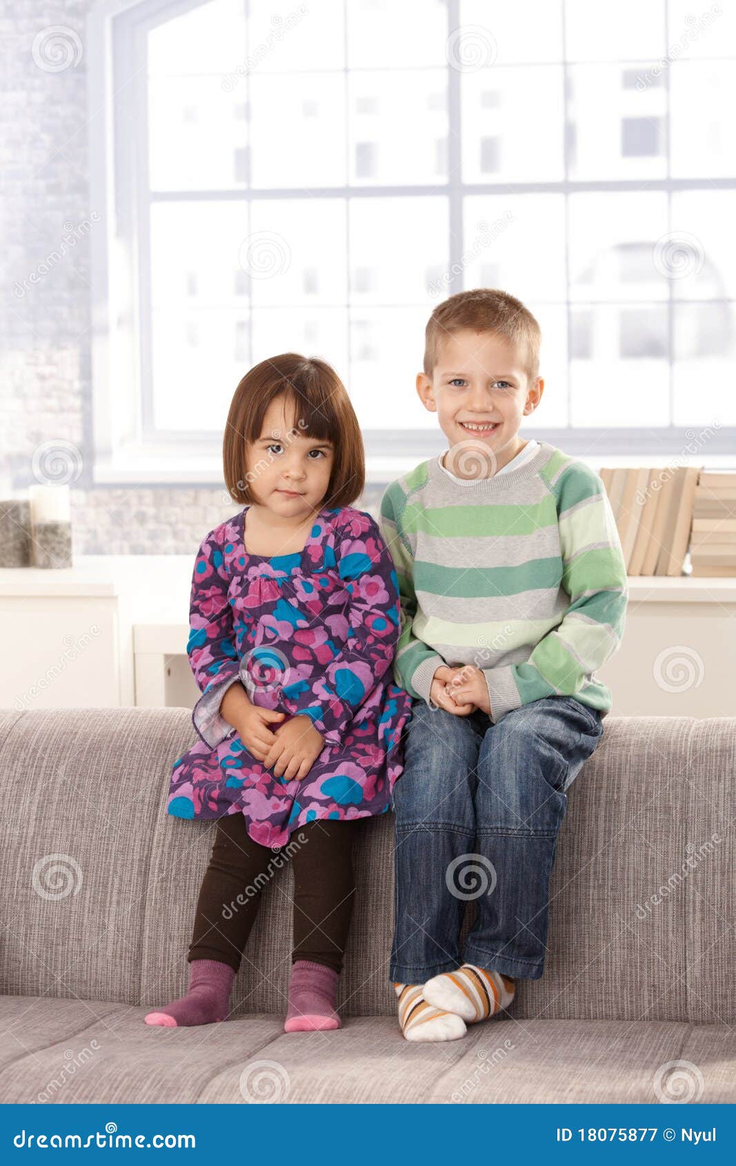 Smiling Children Sitting on Sofa Stock Image - Image of couch, children ...