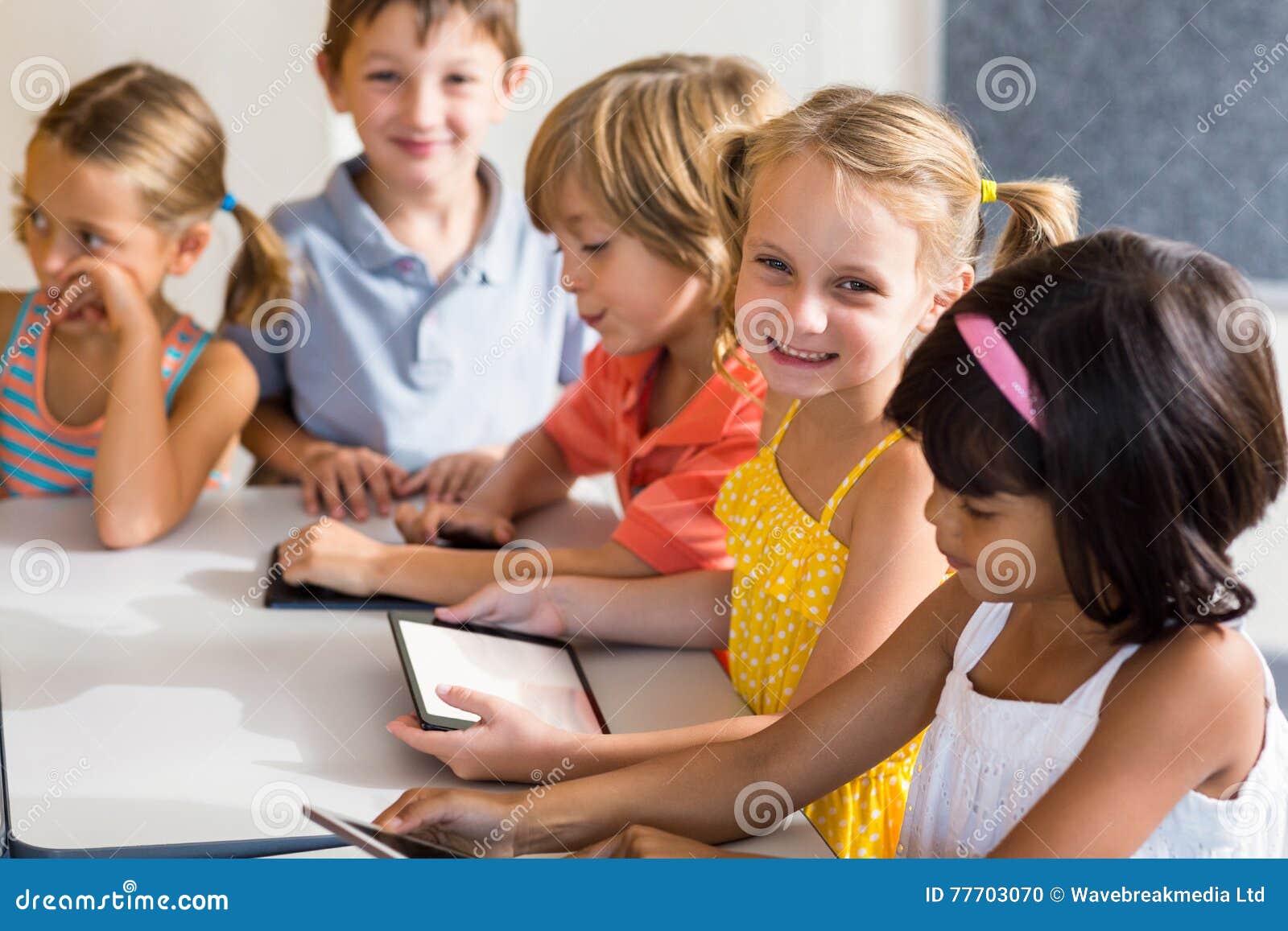 Smiling Children Using Digital Tablets Stock Photo - Image of cute ...