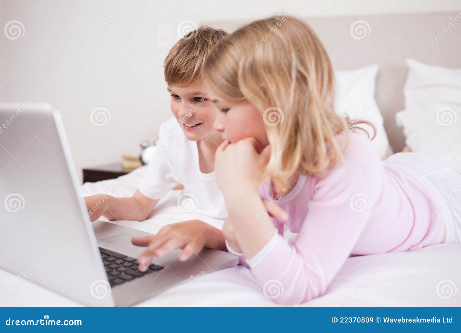 Smiling Children Using a Laptop Stock Image - Image of computer, cute ...
