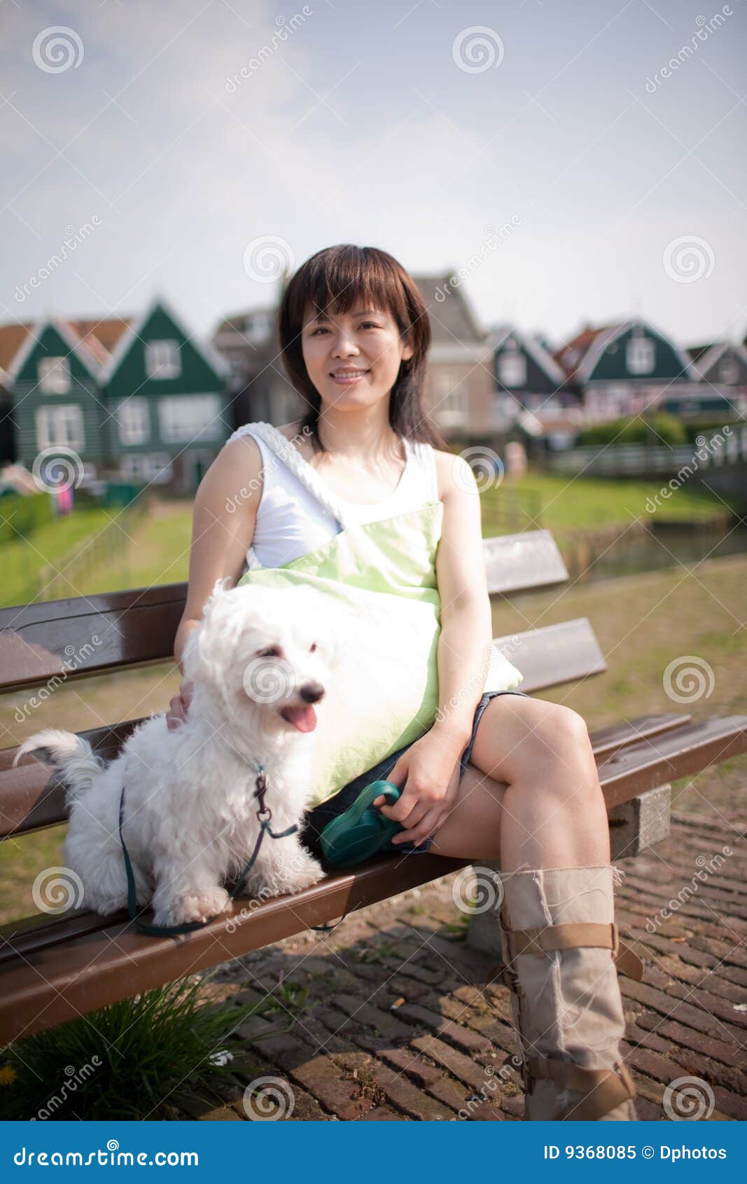 Smiling Chinese Girl with Dog Stock Image - Image of background, blue ...