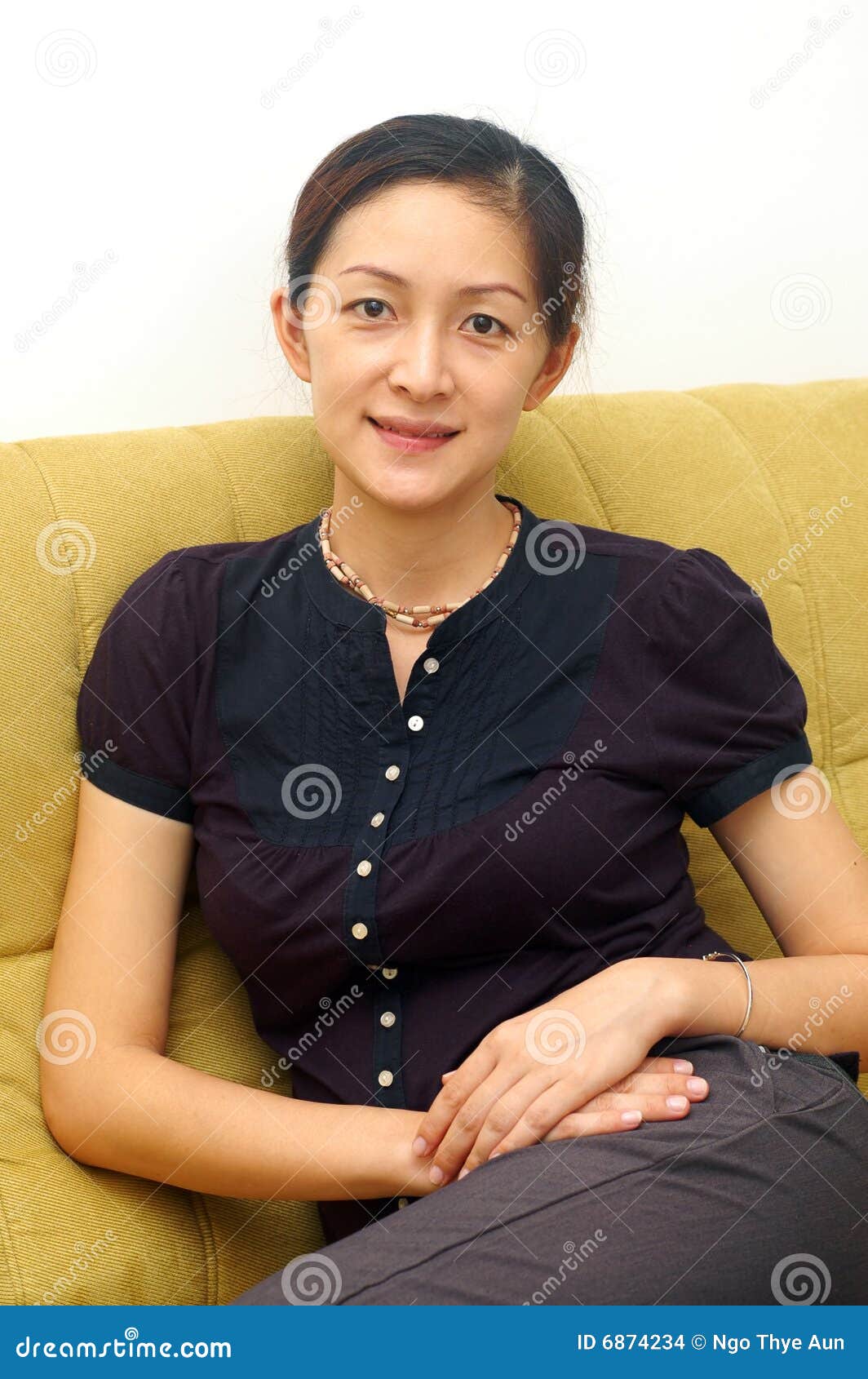 Smiling Chinese Lady stock photo. Image of woman, sitting - 6874234