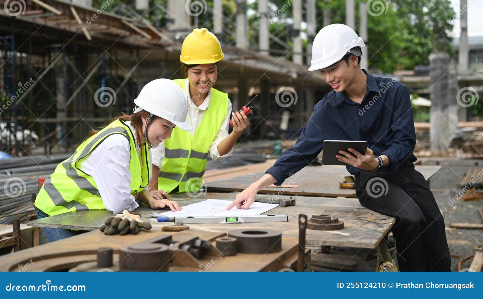 Smiling Civil Engineer and Architects are Planning Development Details ...