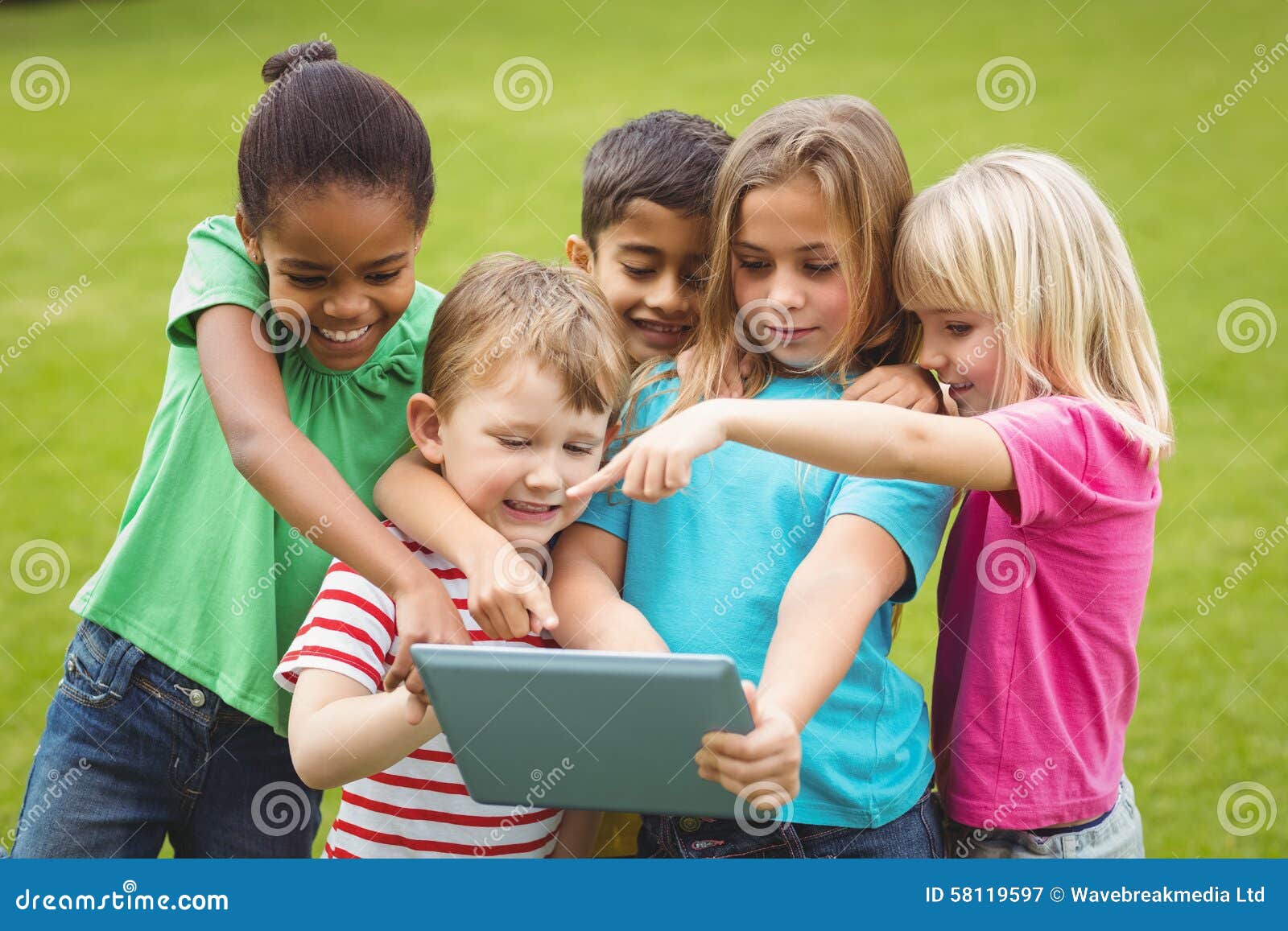 Smiling Classmates Using Tablet Together Stock Image - Image of campus ...
