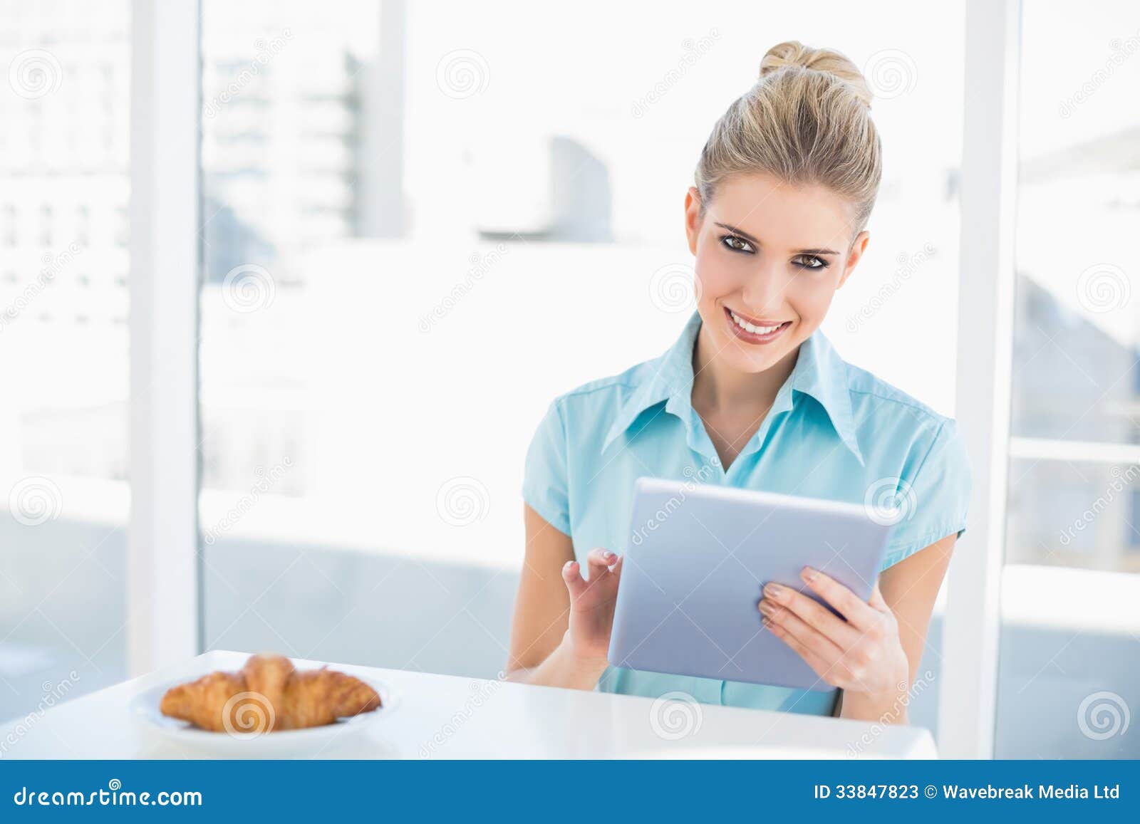 Smiling Classy Woman Using Tablet while Having Breakfast Stock Image ...