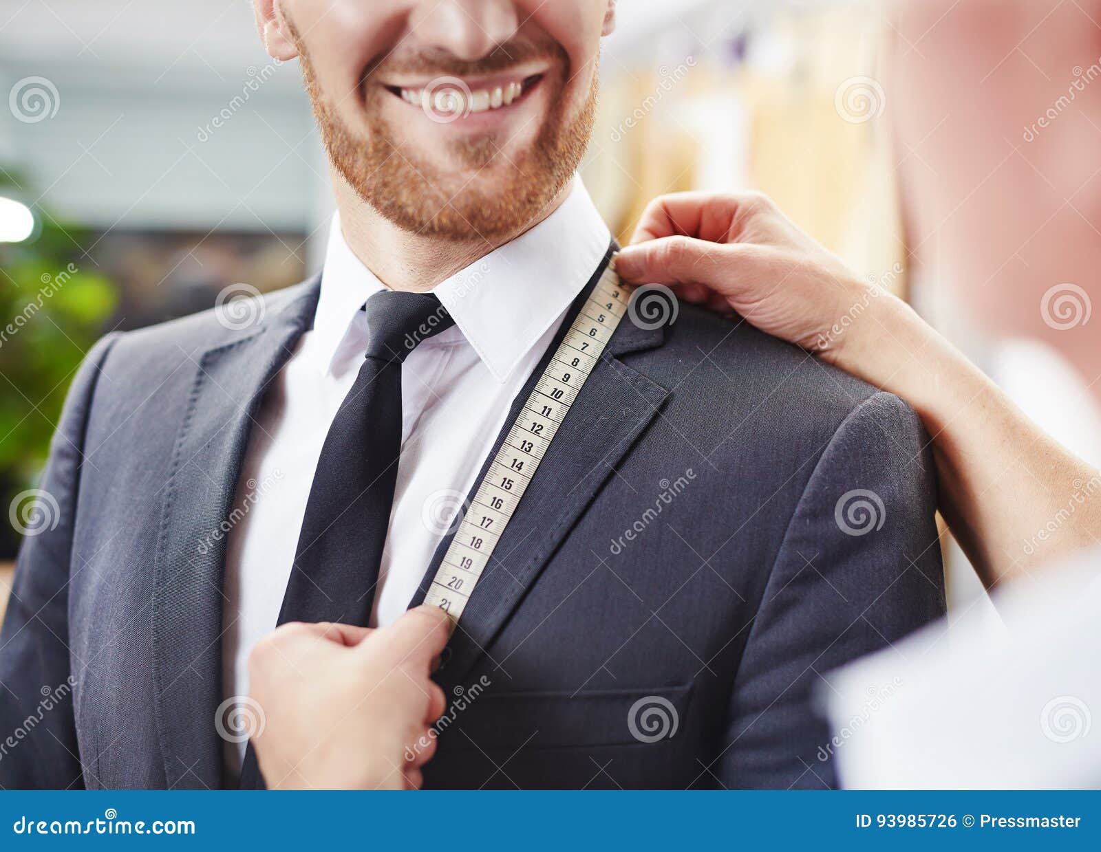Smiling Client Posing at Model Fitting Stock Photo - Image of jacket ...