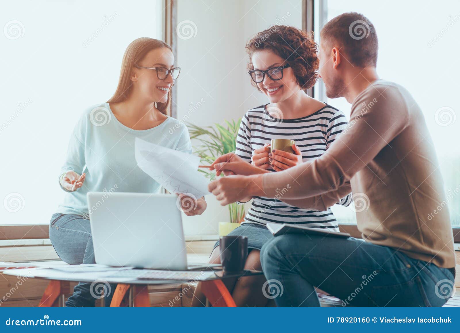 Smiling Colleagues Discussing the Project at Work Stock Photo - Image ...