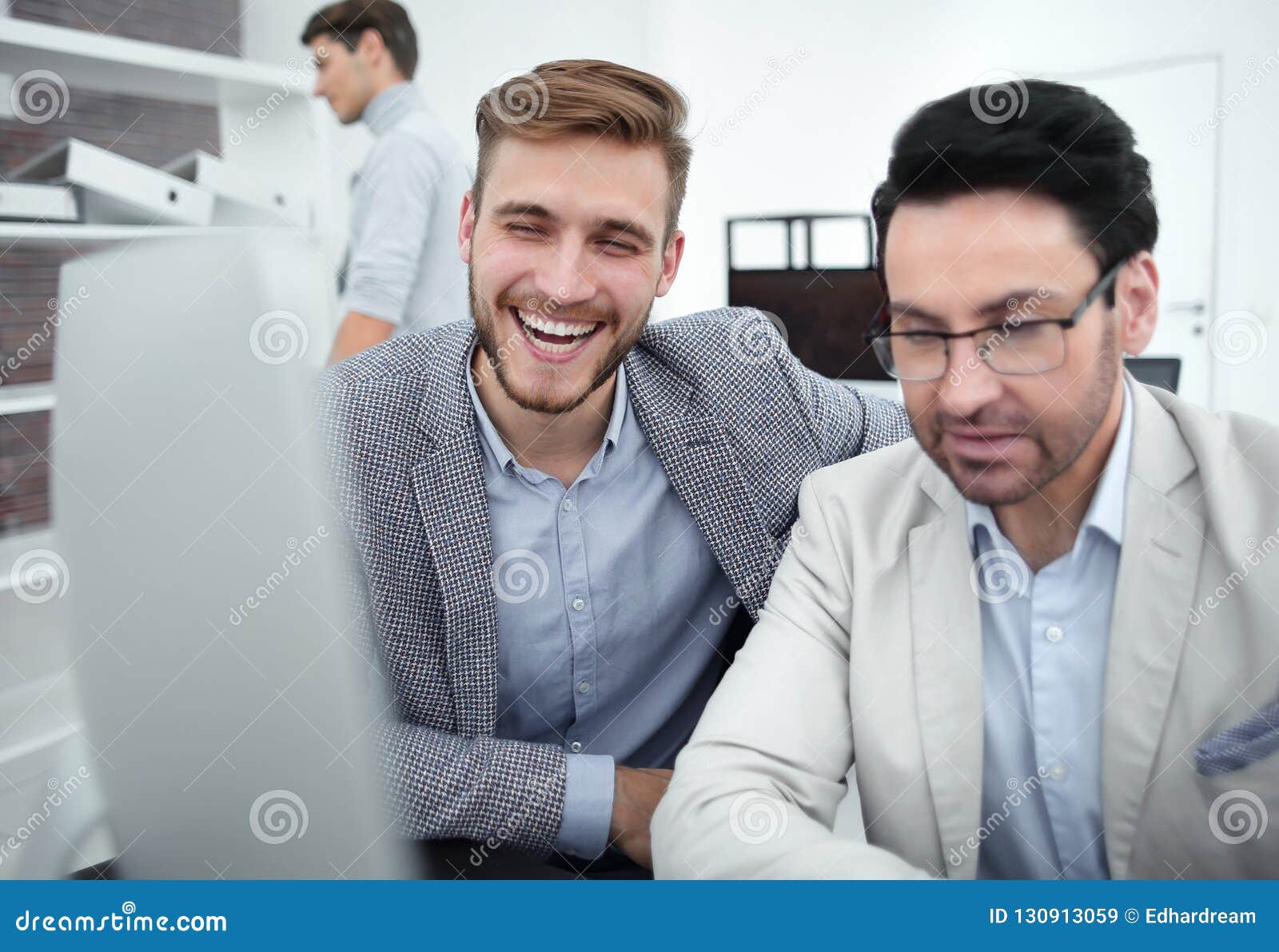 Smiling Colleagues Looking at the Computer Monitor Stock Image - Image ...