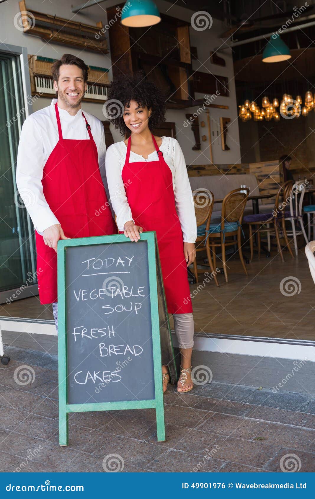 Smiling Colleagues Posing Behind a Chalkboard Stock Photo - Image of ...