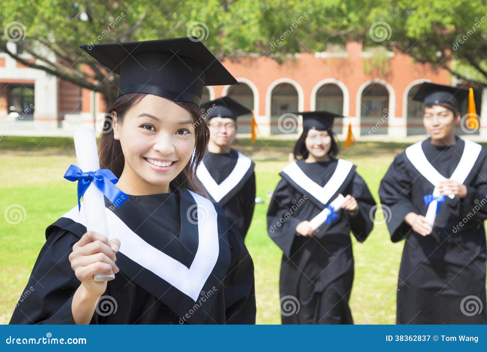 Smiling College Graduate Show a Diploma Stock Image - Image of ...