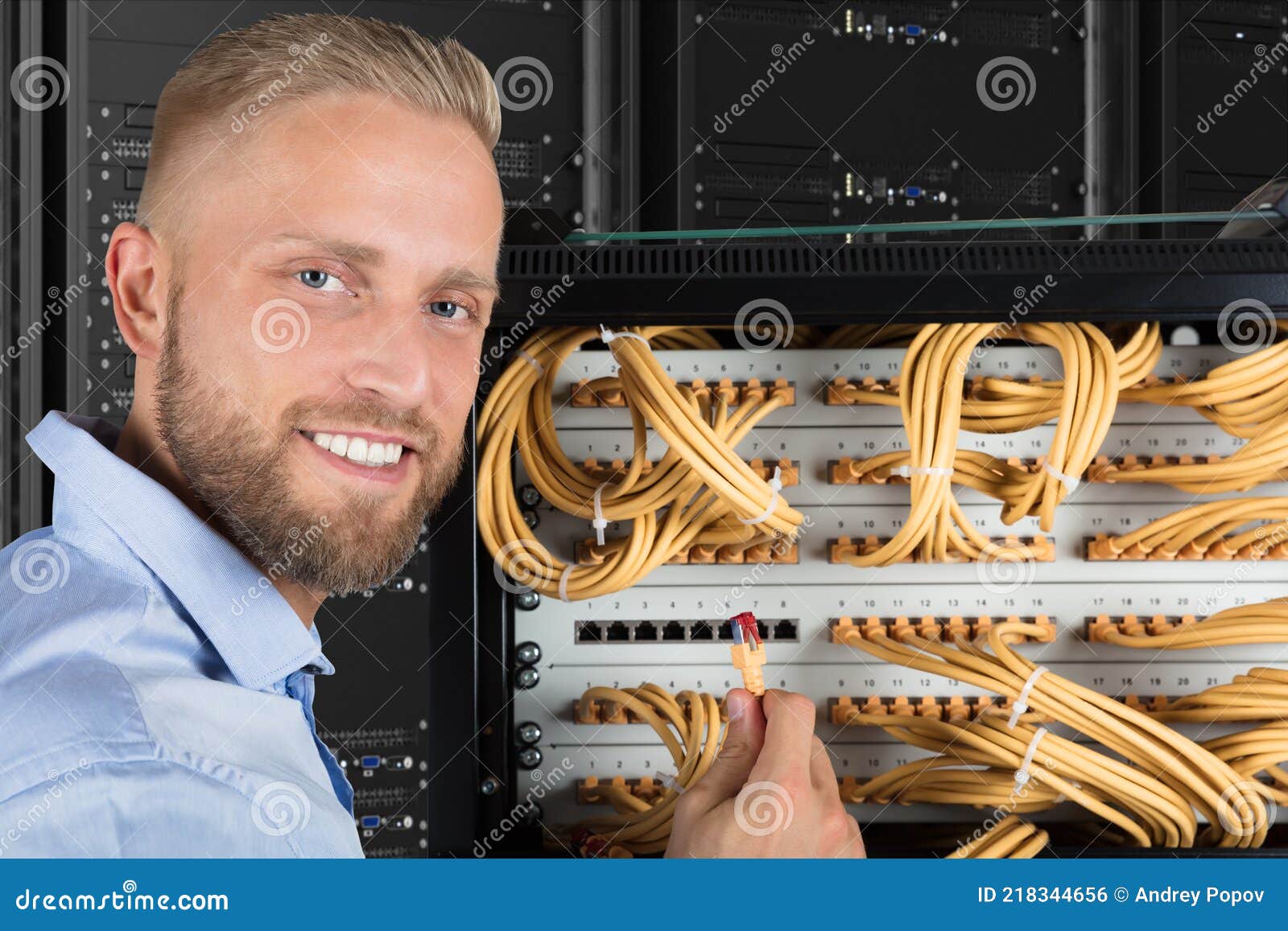 Smiling Computer Technician Stock Photo - Image of network, looking ...