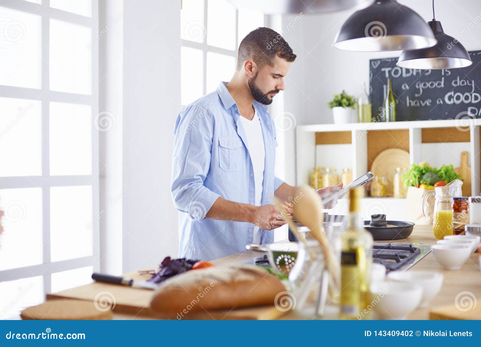 Smiling and Confident Chef Standing in Large Kitchen Stock Photo ...