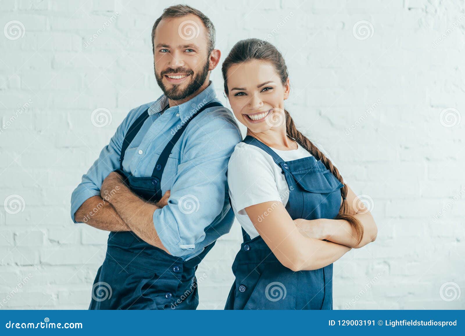 Smiling Confident Workers in Uniform Posing Stock Image - Image of ...