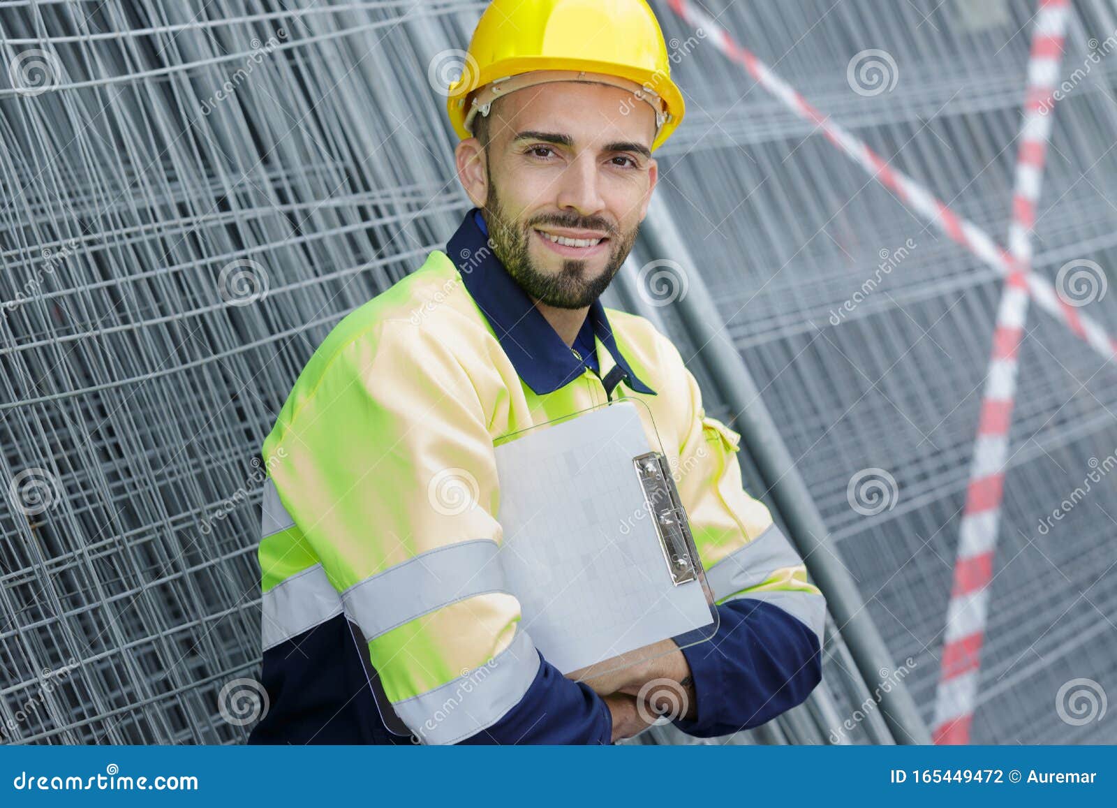 Smiling Construction Manager Standing on Building Site Stock Photo ...