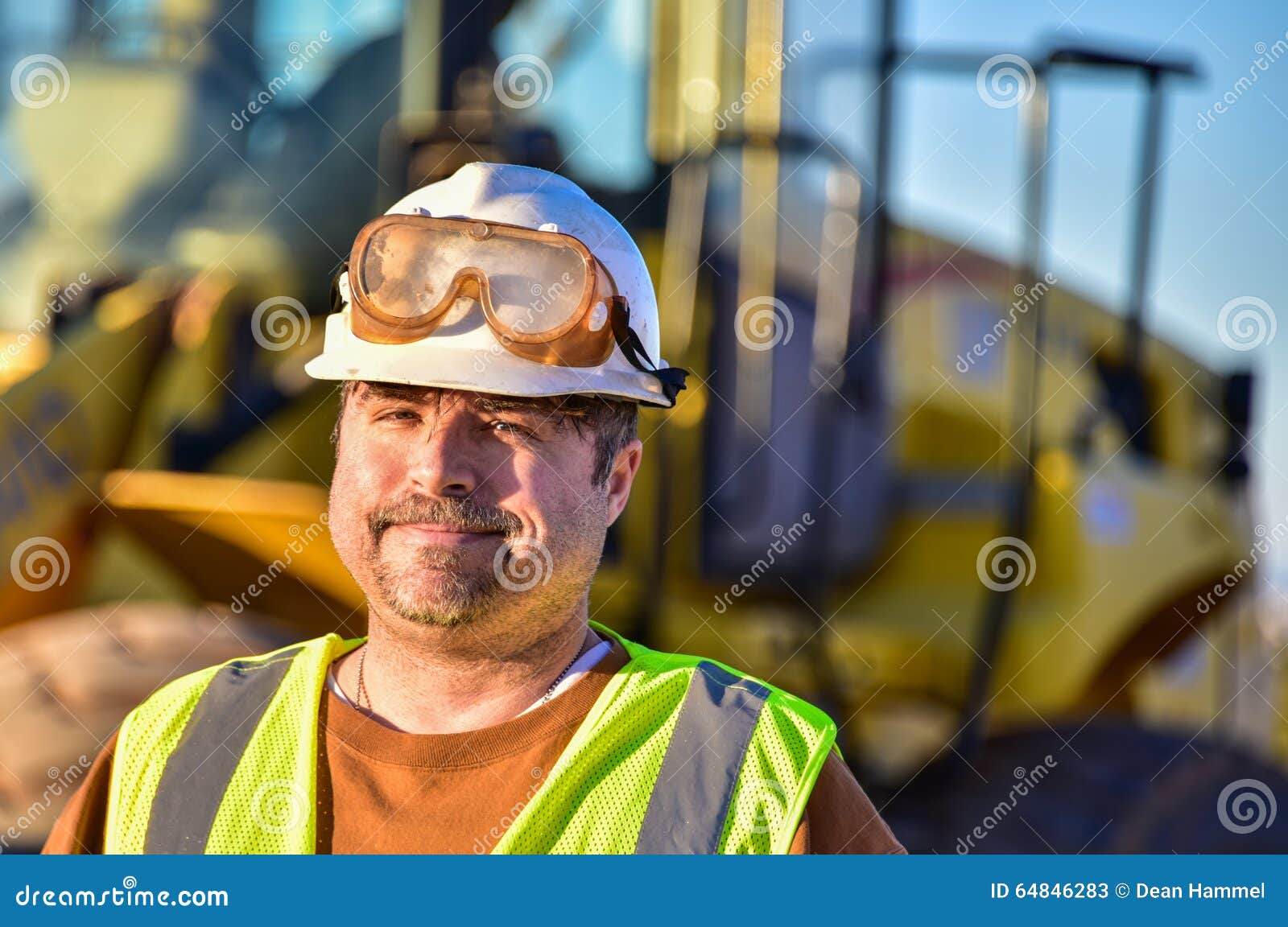 Smiling Construction Worker Stock Image - Image of goatee, machinery ...