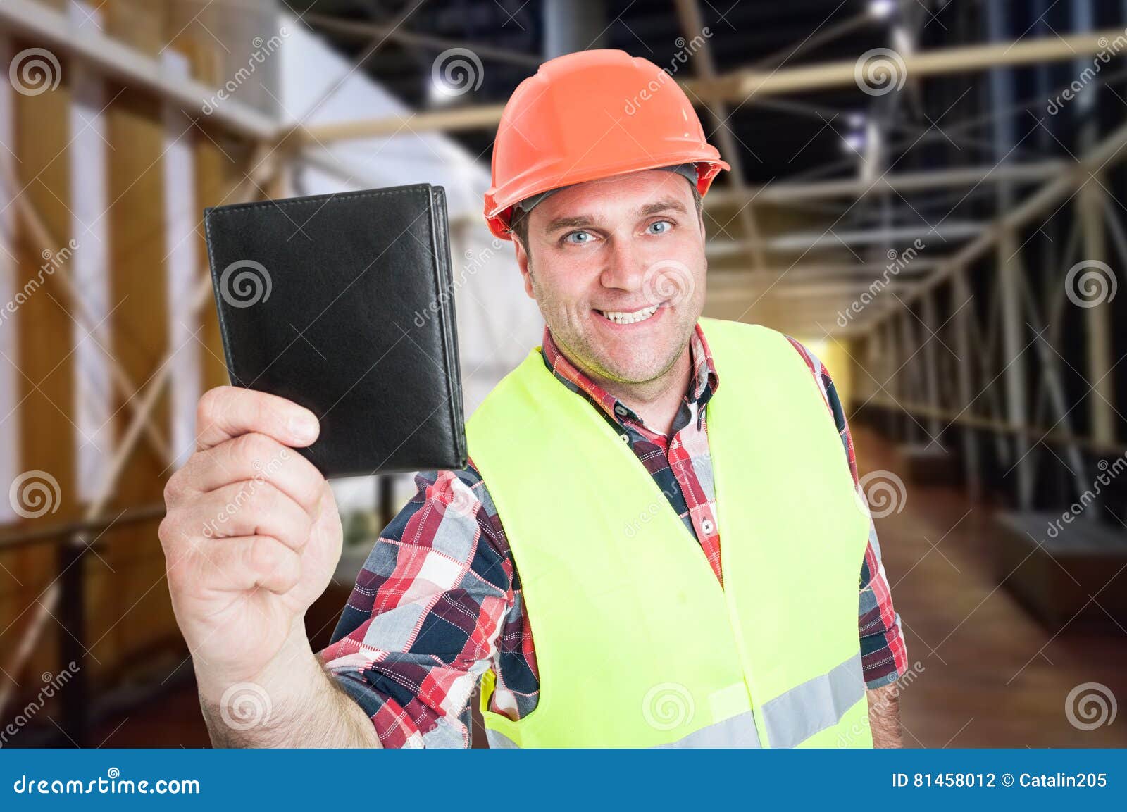 Smiling Construction Worker with Money Wallet Stock Photo - Image of ...