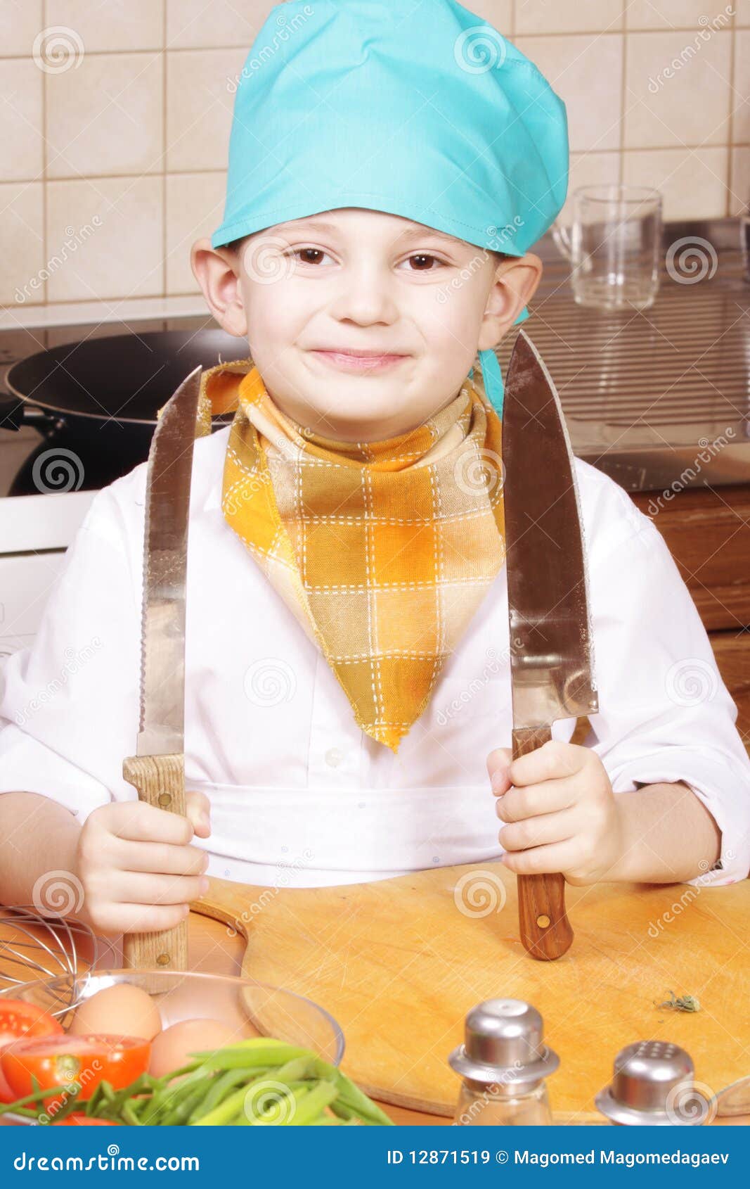 Smiling Cook with Two Knives Stock Image - Image of young, green: 12871519