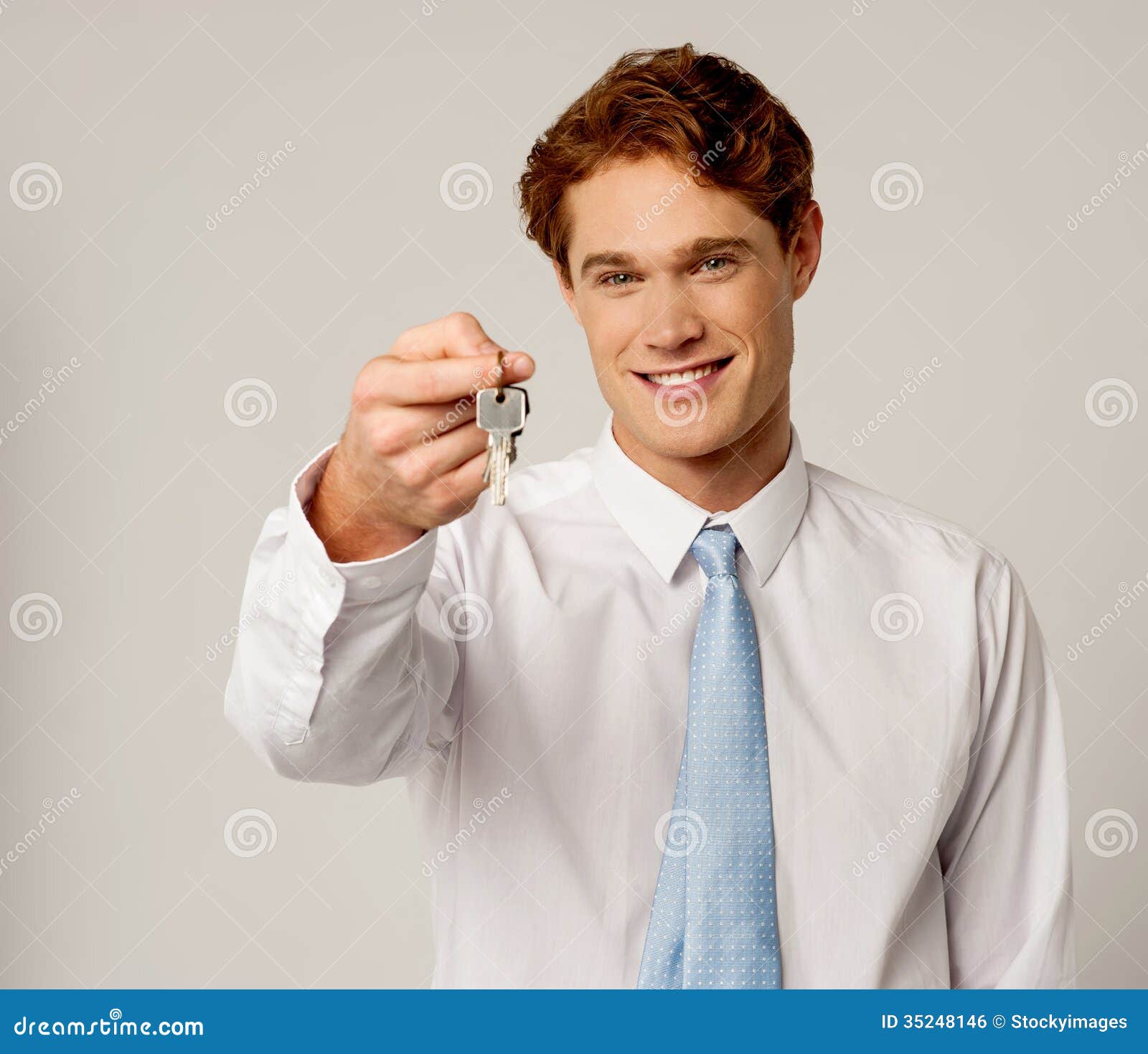 Smiling Corporate Holding a Key Stock Photo - Image of experienced ...