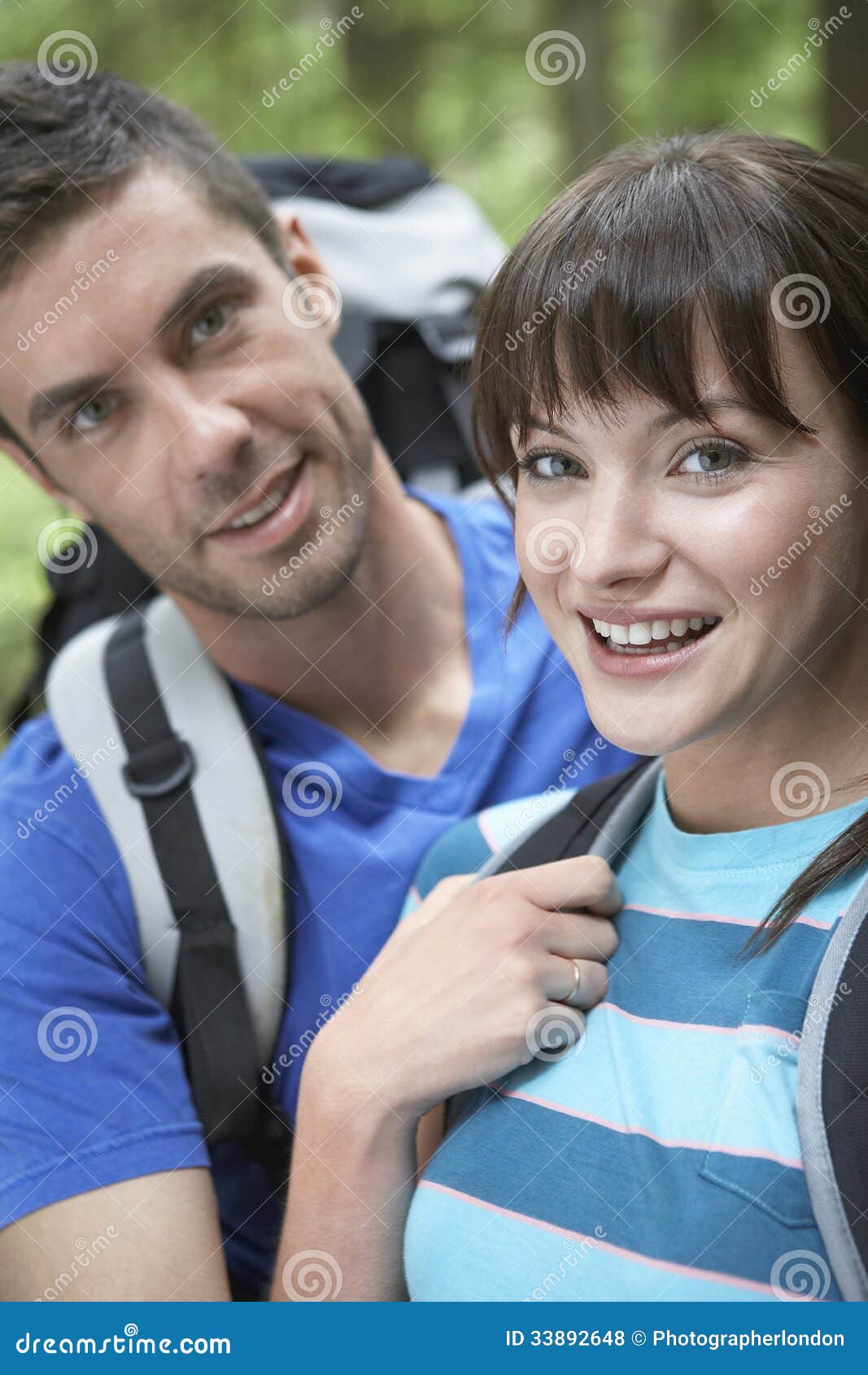 Smiling Couple with Backpacks Stock Photo - Image of smiling, hiking ...