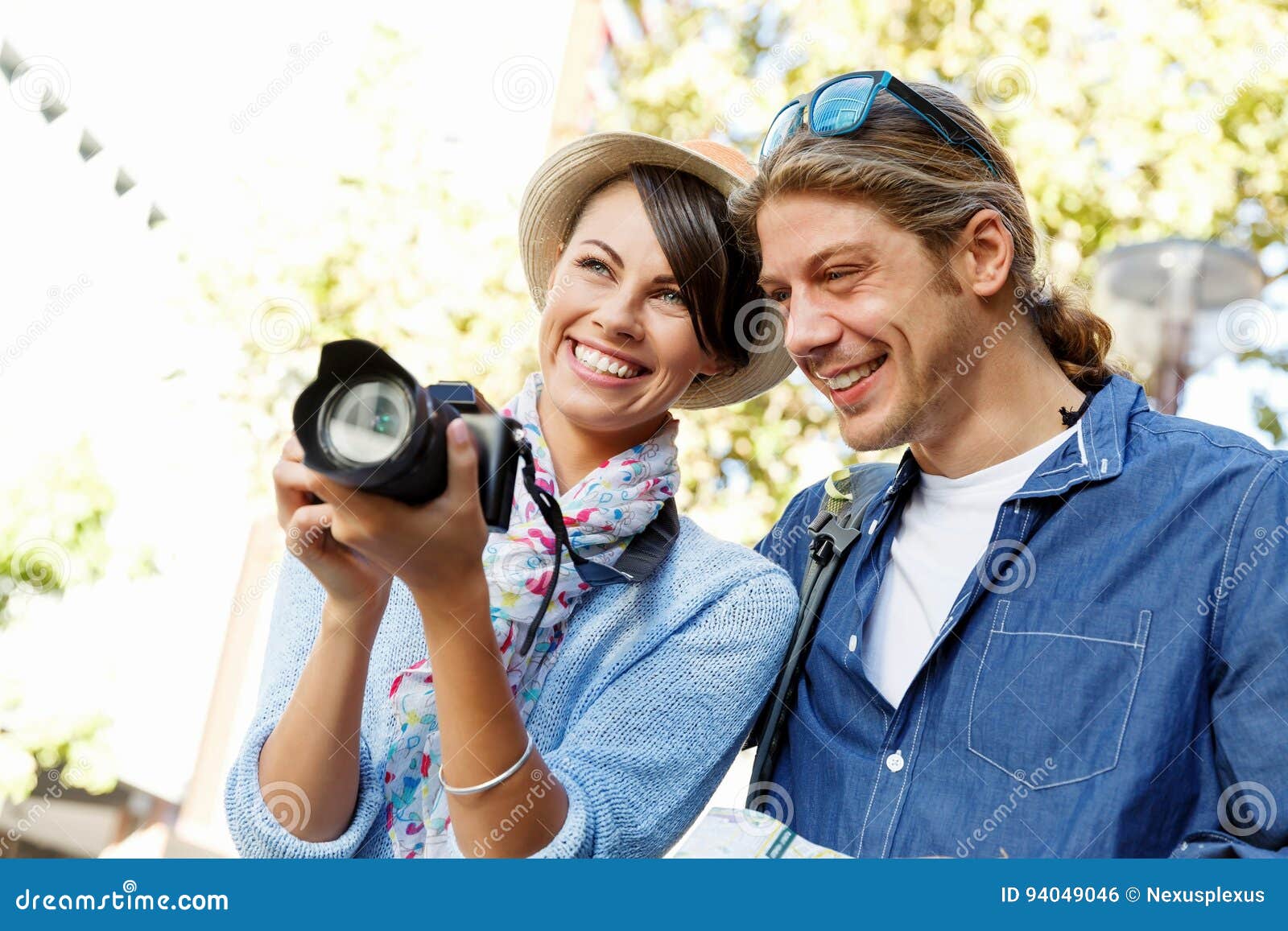 Smiling Couple with the Camera Stock Photo - Image of landmarks ...