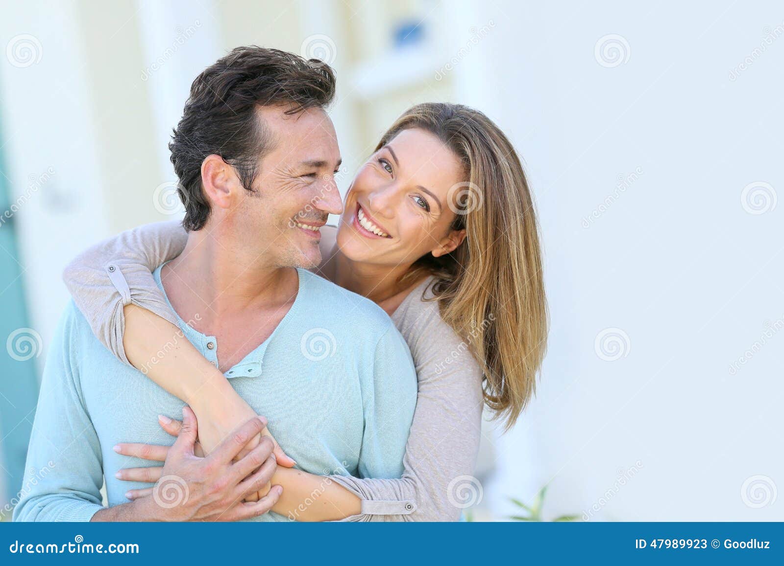 Smiling Couple in Front of the House Stock Image - Image of outdoors ...