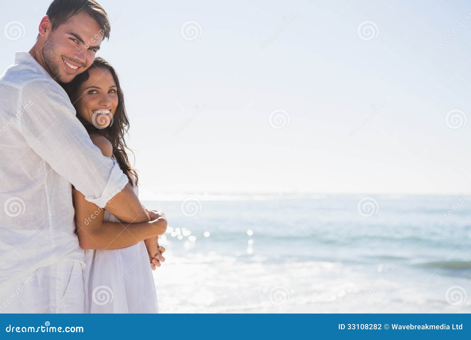 Smiling Couple Hugging and Looking at Camera Stock Photo - Image of ...