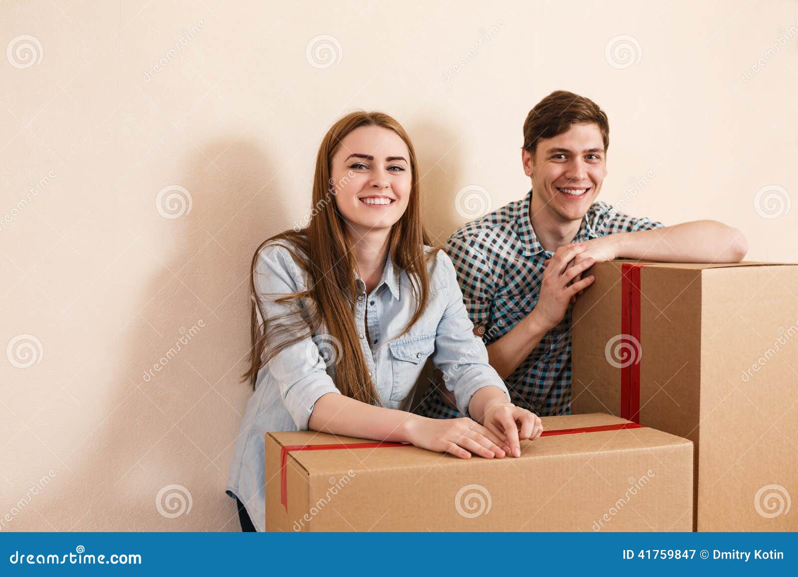 Smiling Couple Leaning on Boxes Stock Image - Image of leaning ...
