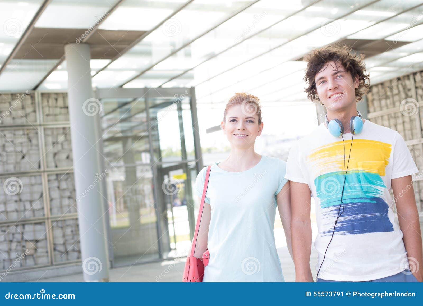 Smiling Couple Looking Away while Standing in City Stock Image - Image ...
