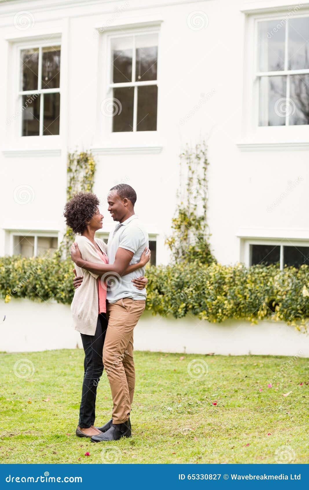 Smiling Couple Looking Back at the Camera Stock Image - Image of couple ...