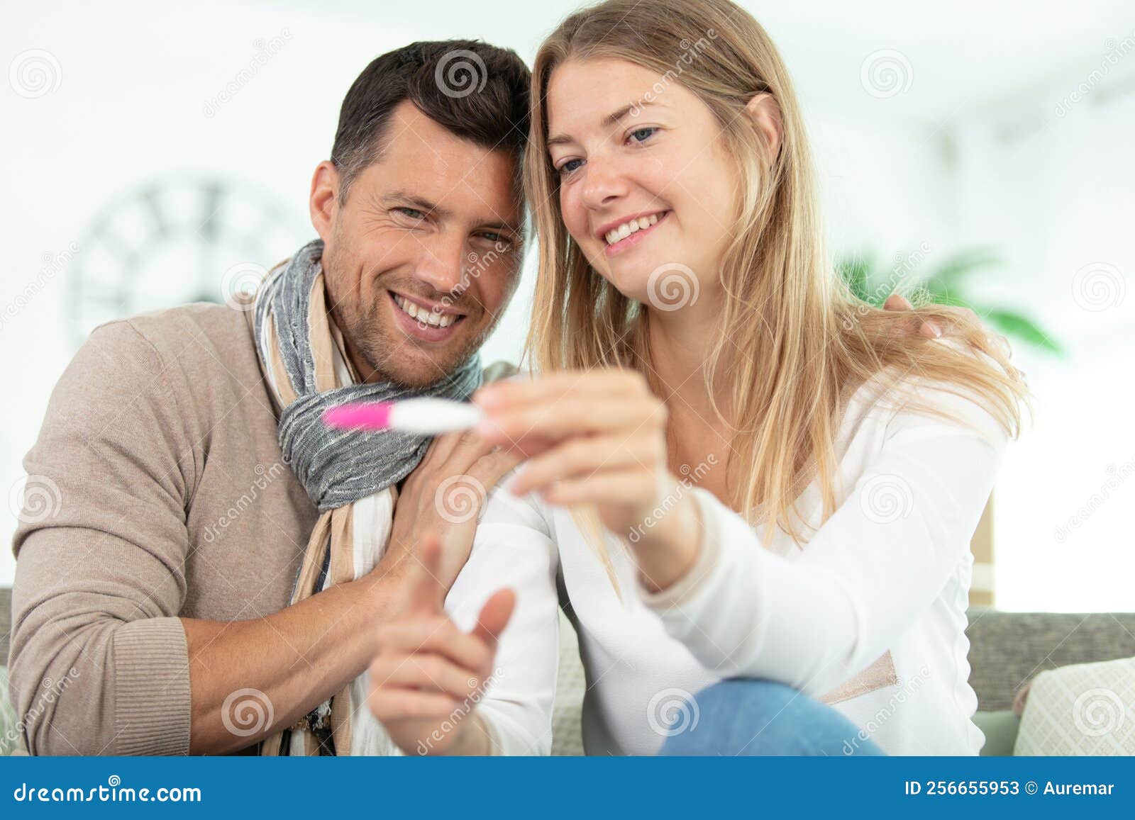 Smiling Couple Looking at Pregnancy Test Stock Image - Image of ...