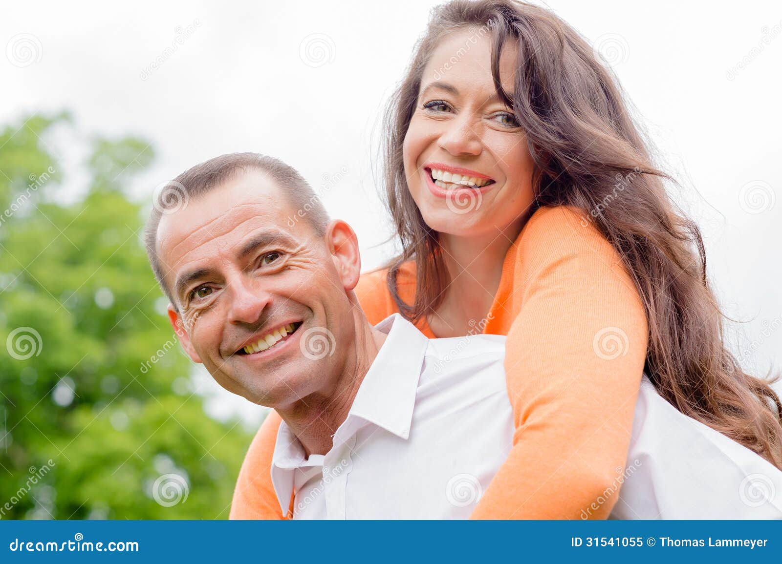 Smiling couple stock image. Image of husband, green, couples - 31541055