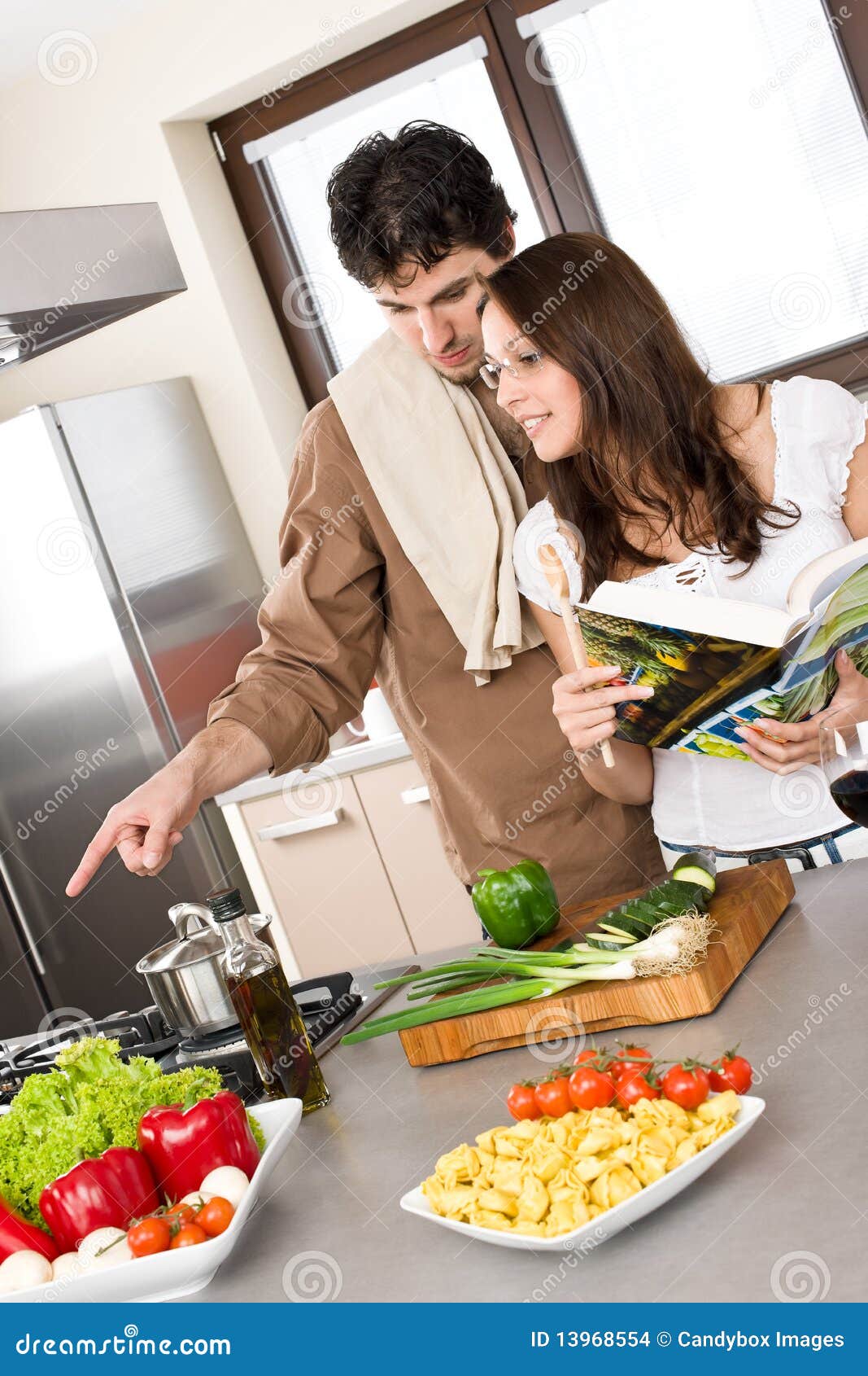 Smiling Couple in Modern Kitchen Cook Together Stock Photo - Image of ...