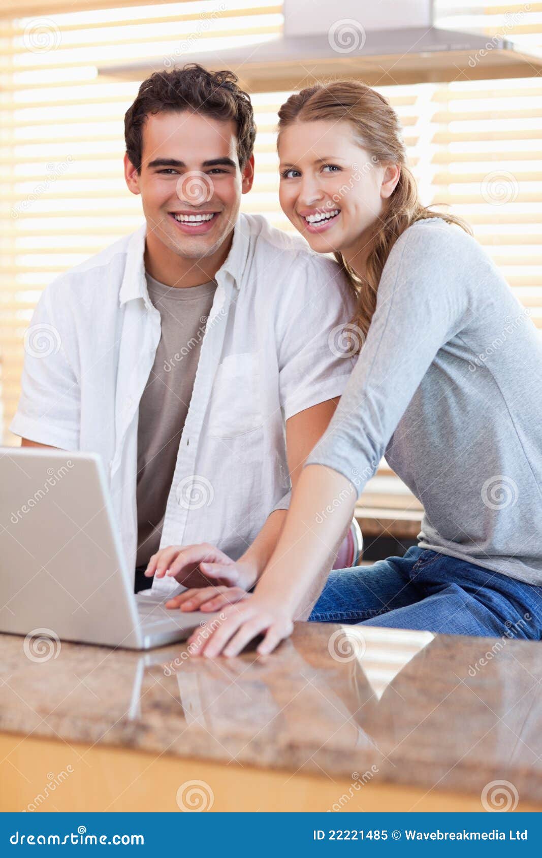 Smiling Couple with Notebook in the Kitchen Stock Image - Image of ...