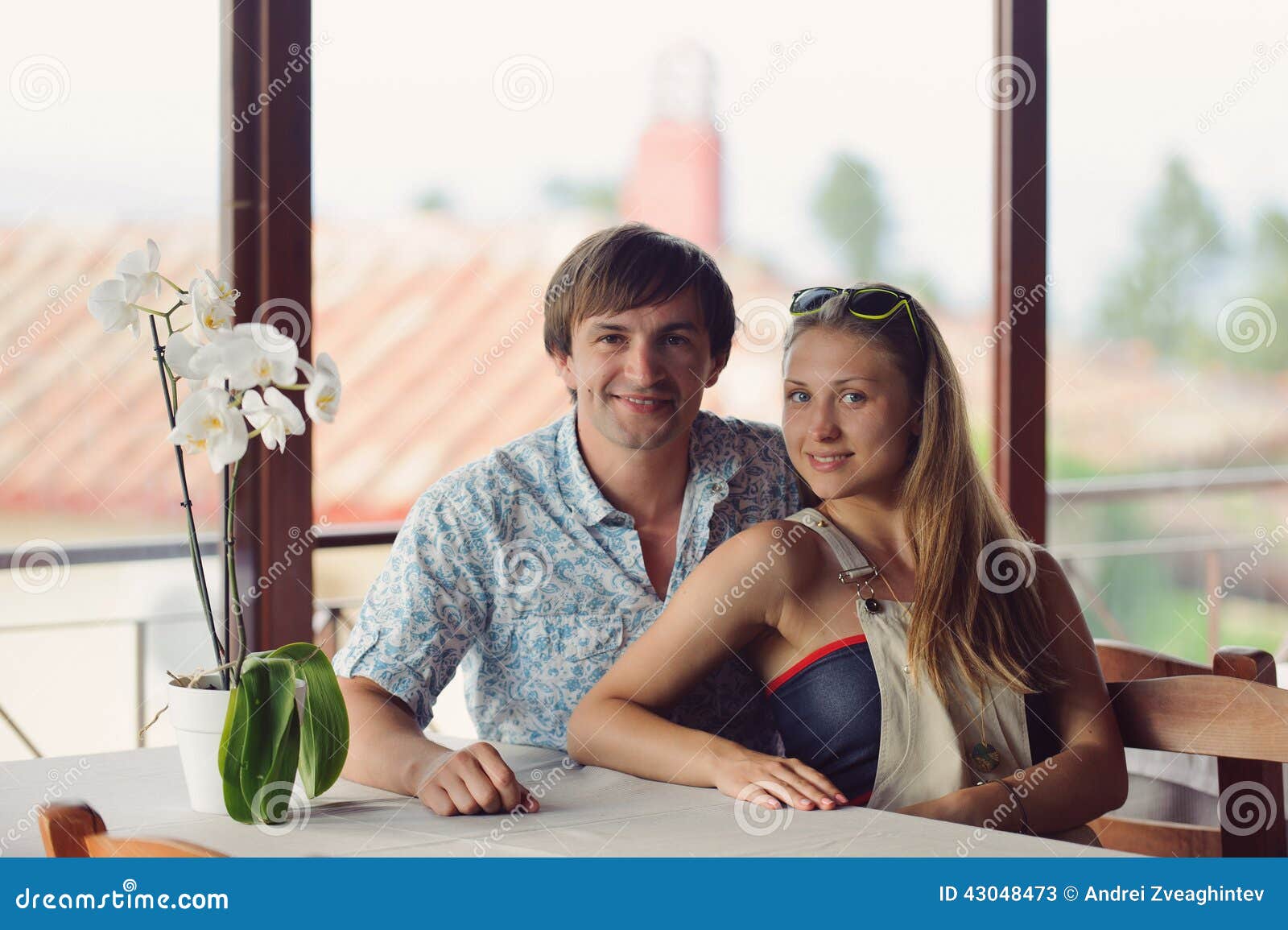 Smiling Couple at Table stock image. Image of portrait - 43048473