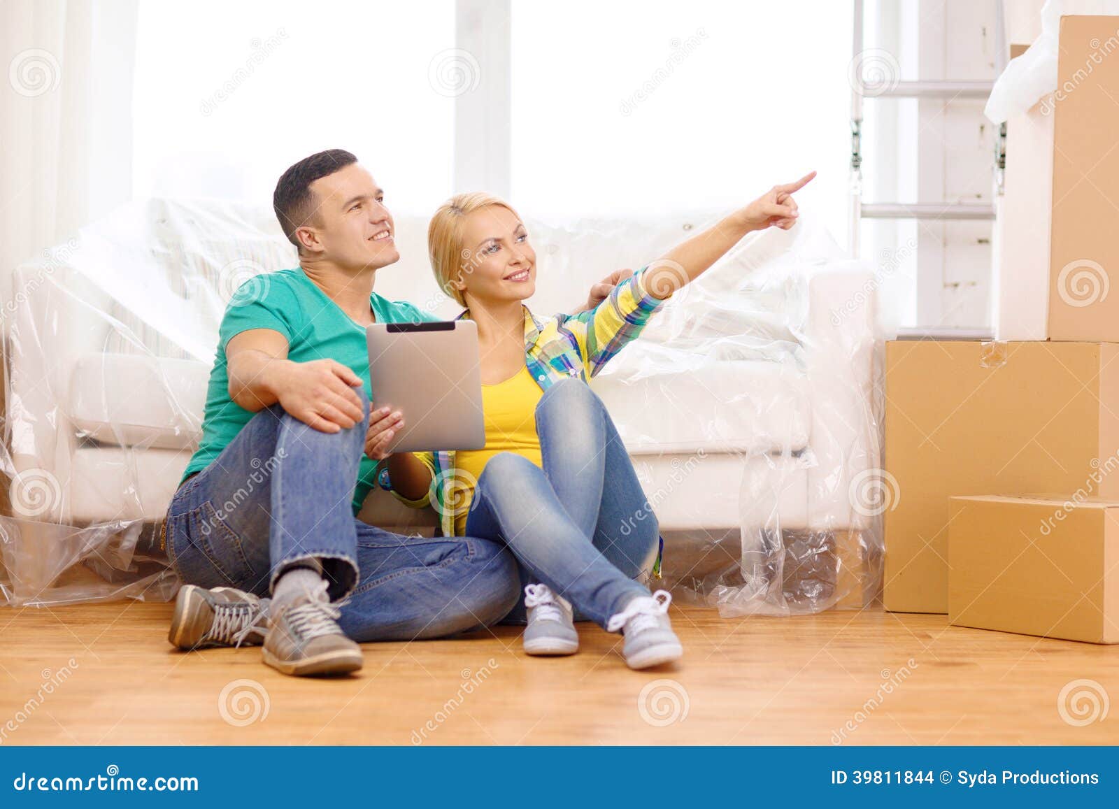Smiling Couple with Tablet Pc in New Home Stock Photo - Image of ...