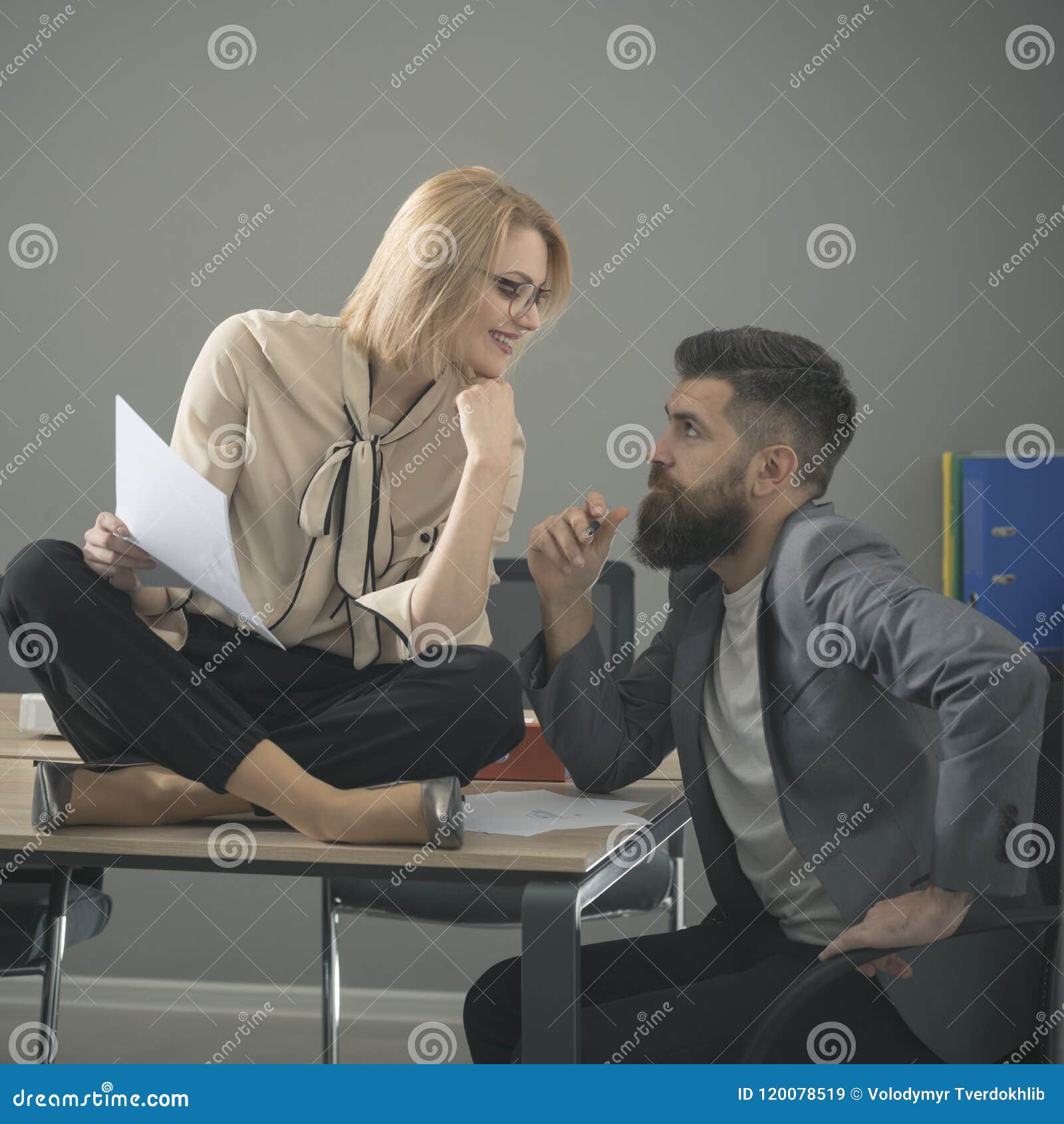 Smiling Couple of Young Colleagues Working in Modern Office. Two ...
