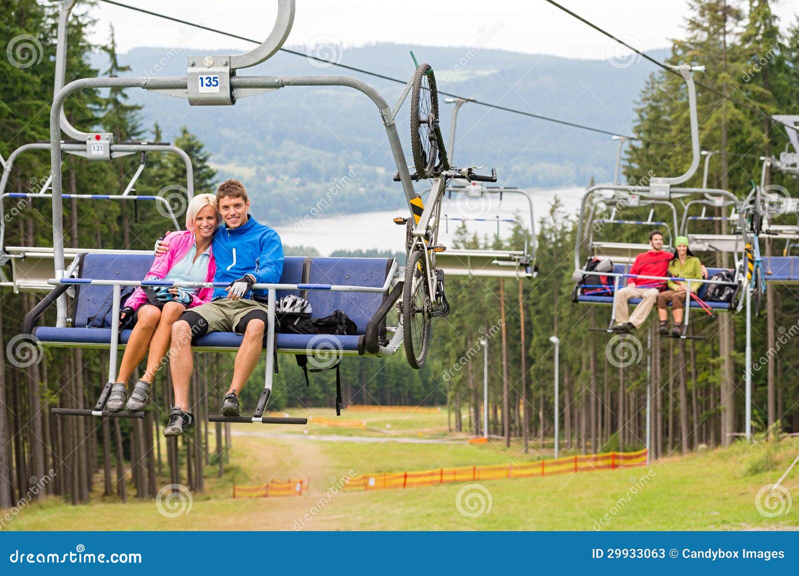 Smiling Couples Using Chair Lift Scenic Landscape Stock Image - Image ...