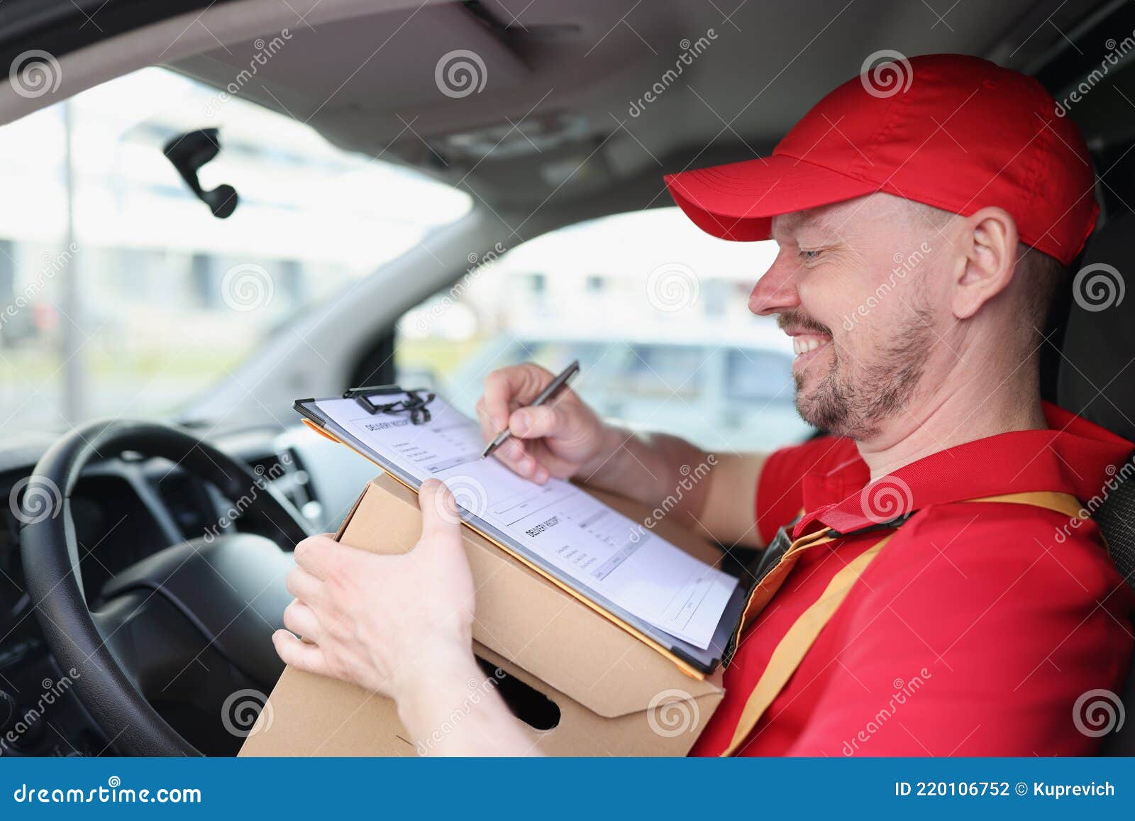 Smiling Courier Driver in Car with Documents and Box Stock Photo ...
