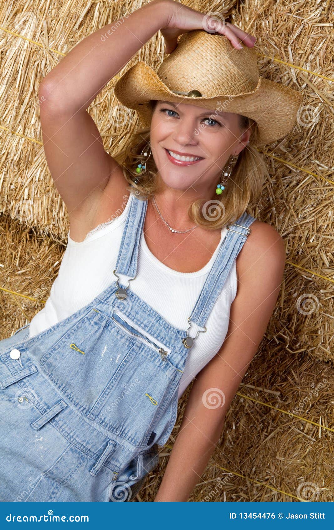 Smiling Cowgirl stock photo. Image of wearing, country - 13454476