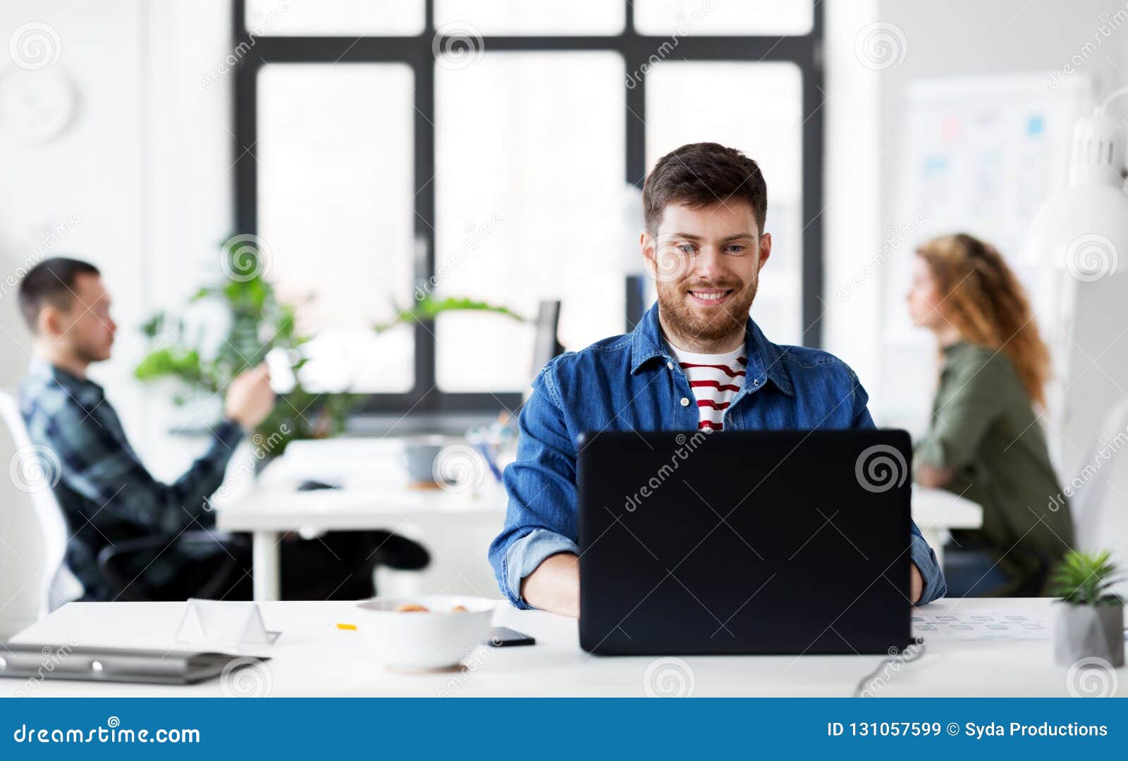Smiling Creative Man with Laptop Working at Office Stock Image - Image ...