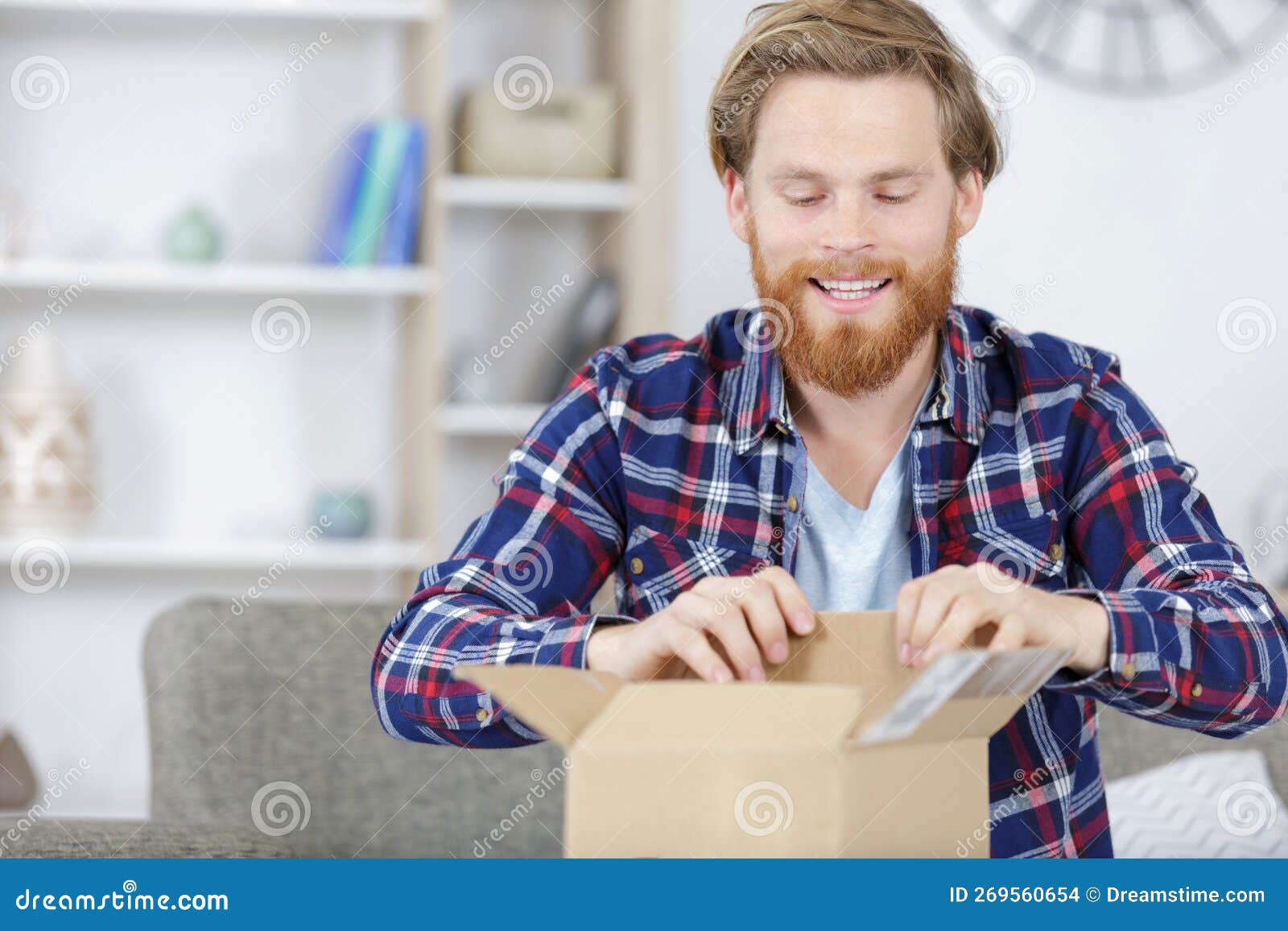Smiling and Curious Man Opening Cardbox Stock Photo - Image of adult ...