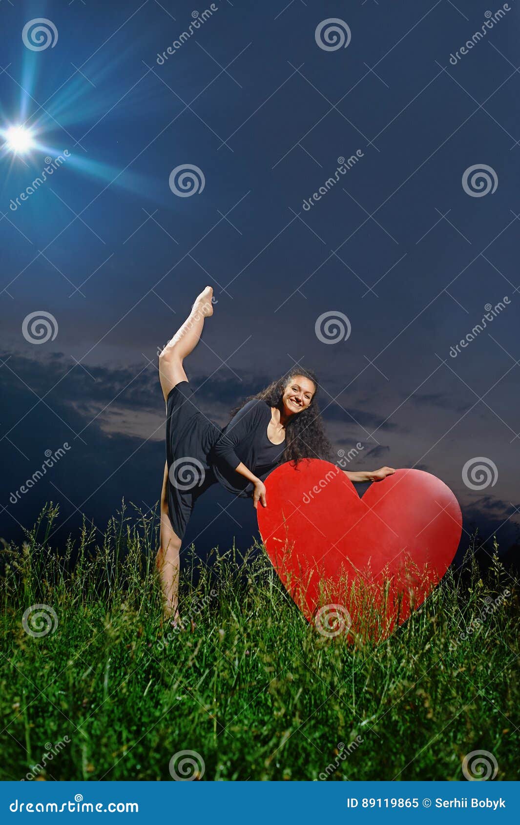 Smiling, Curly Dancer Performs Vertical Side Splits Stock Image - Image ...